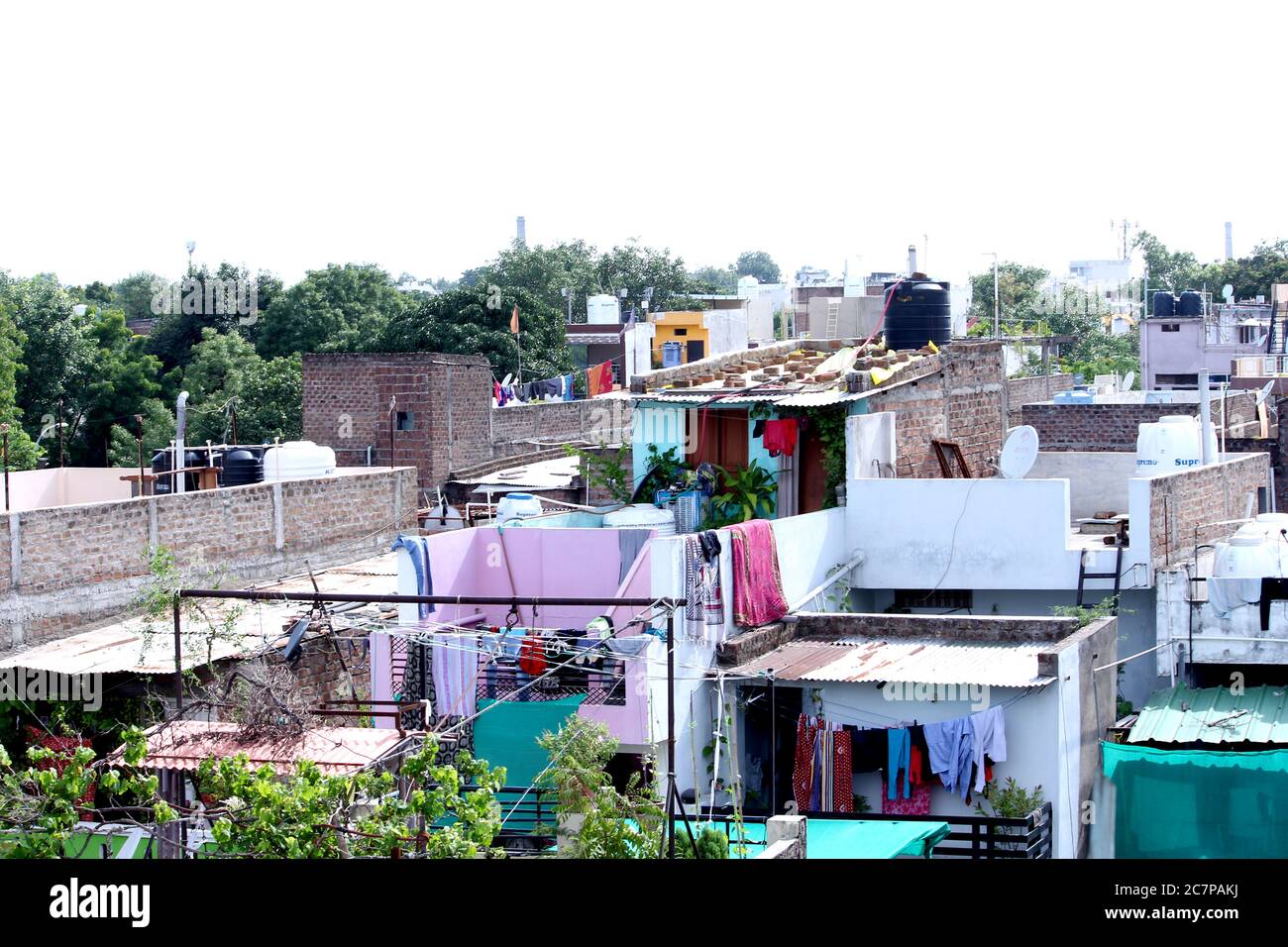 residential buildings and houses in city, Indian street sky background ...