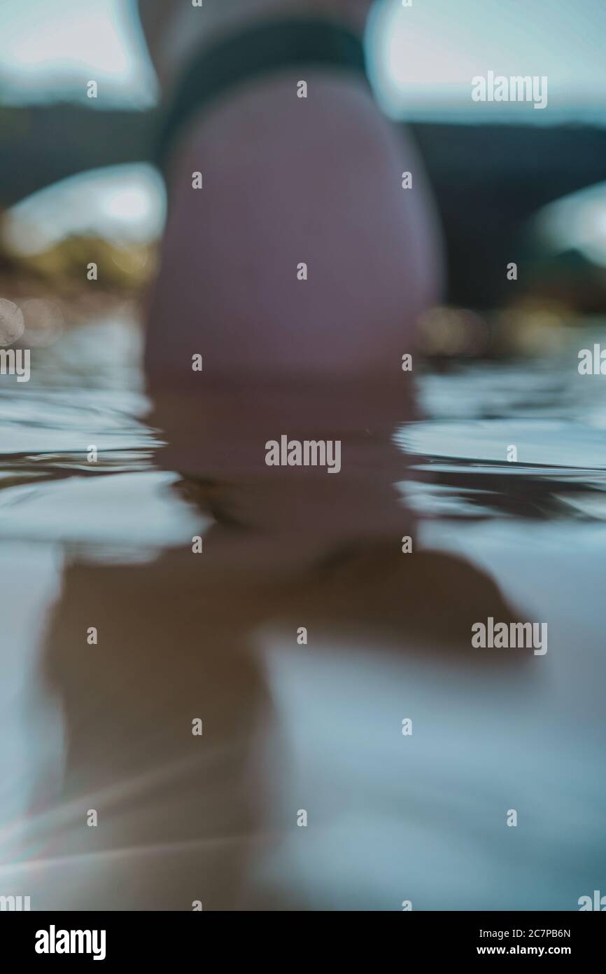 Beautiful woman skinny dipping and wild swimming in river Stock Photo ...