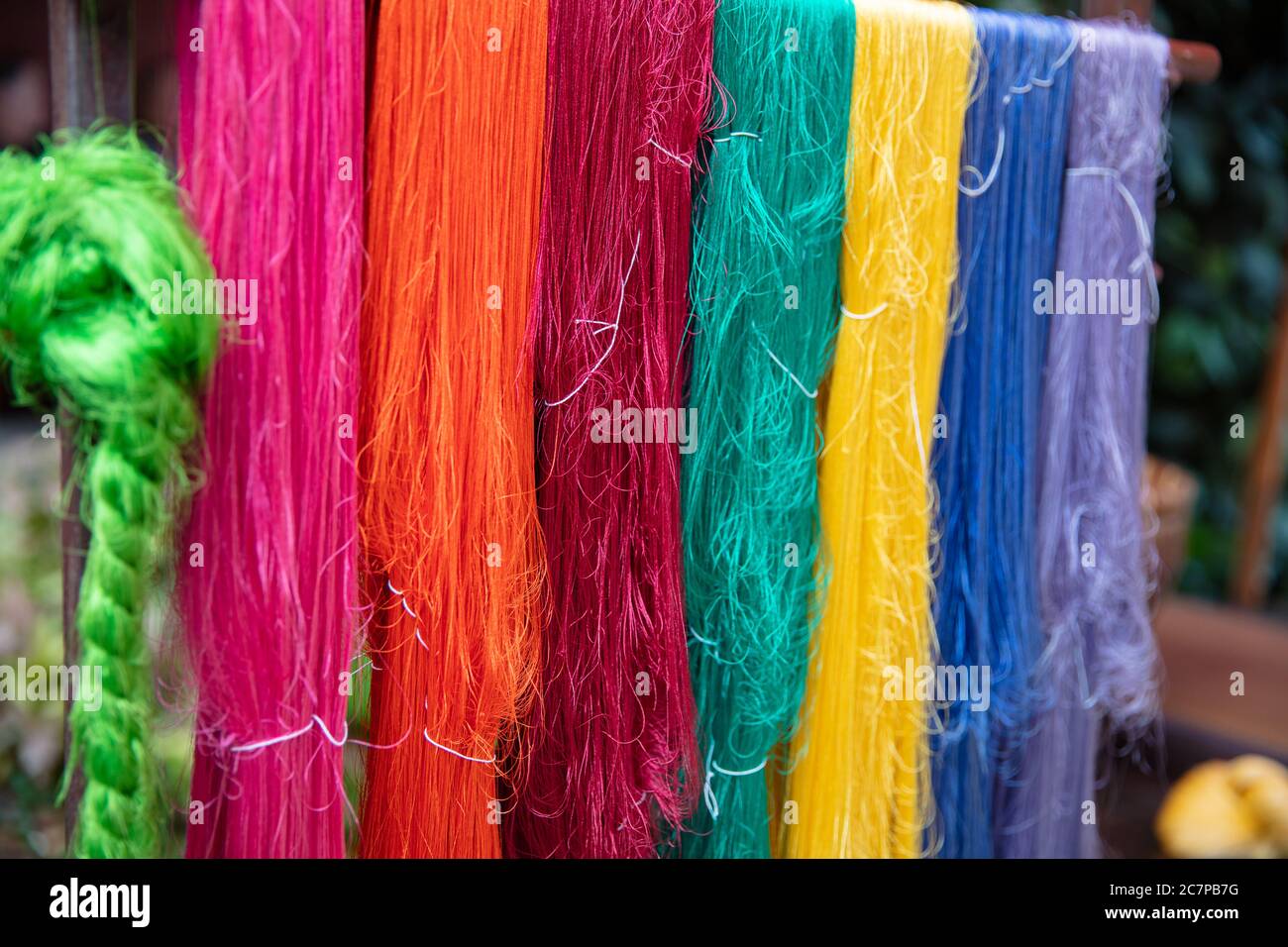 Colorful Silk Yarns Hanging At Manufacturing Factory Stock Photo - Alamy