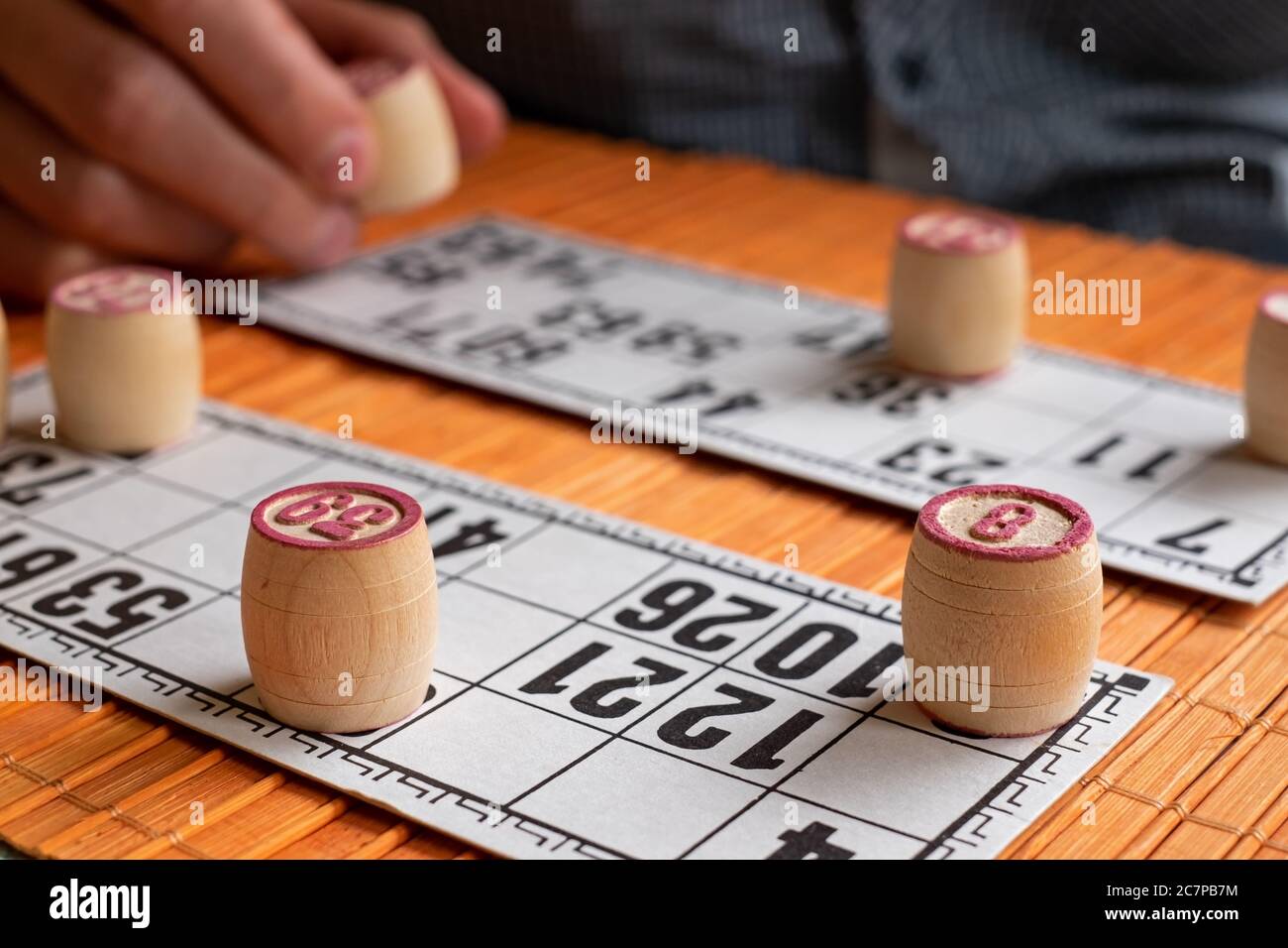 Wooden Lotto barrels with bag, playing cards for Lotto game Stock Photo ...
