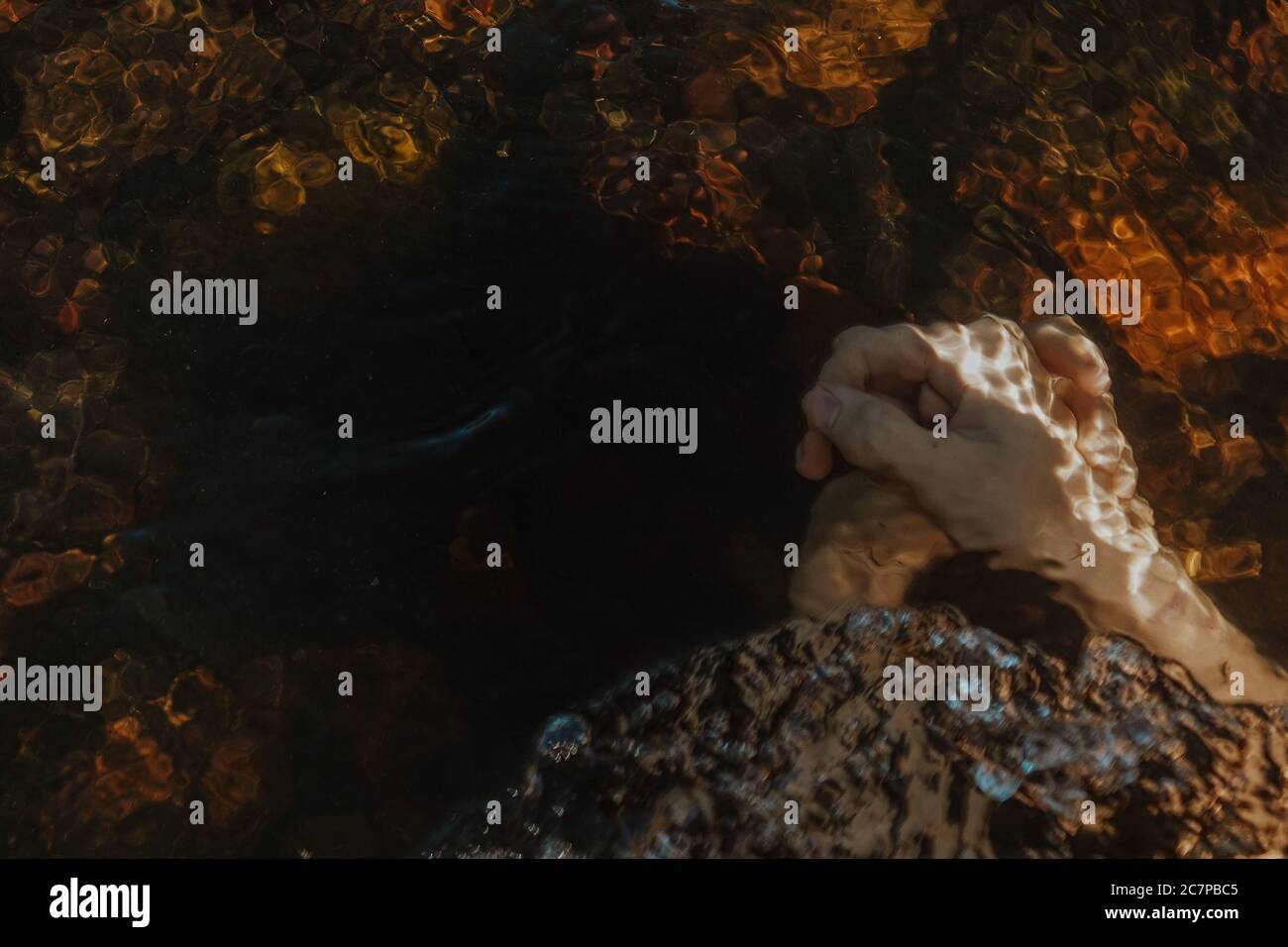 Beautiful woman skinny dipping and wild swimming in river Stock Photo ...