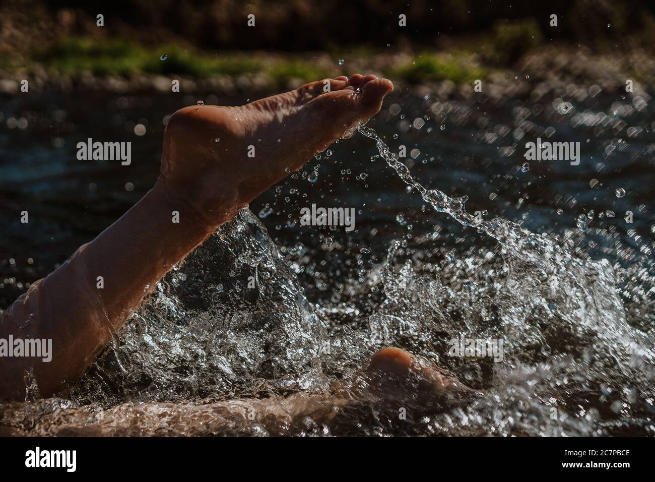 Beautiful woman skinny dipping and wild swimming in river Stock Photo ...