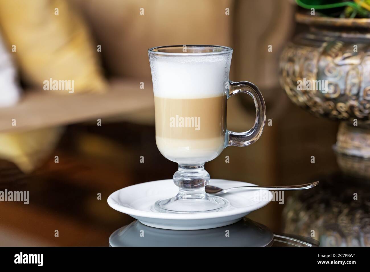 Cappuccino love on glass table hi-res stock photography and images - Alamy