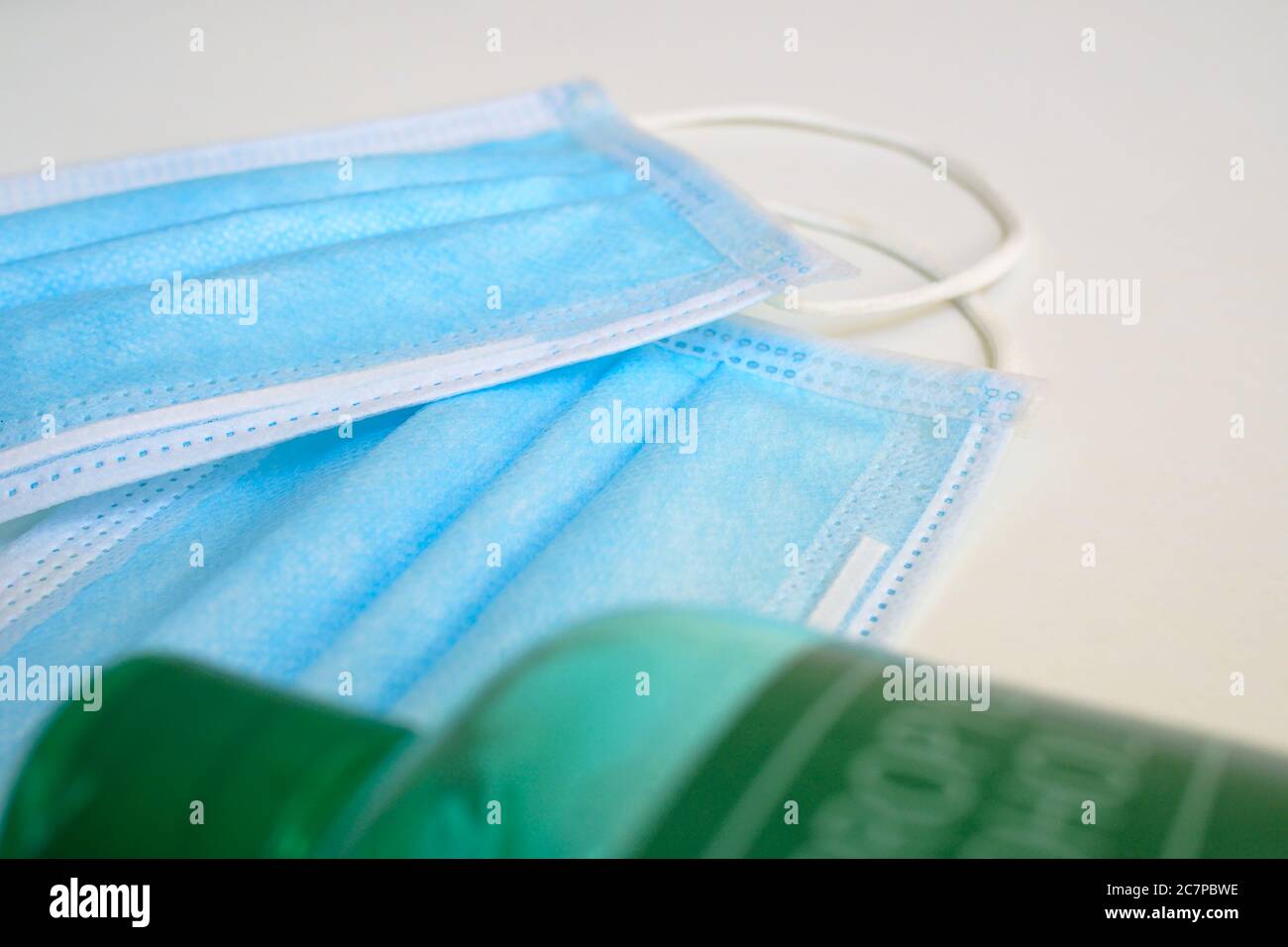 Disposable surgical masks isolated on white table background Stock ...