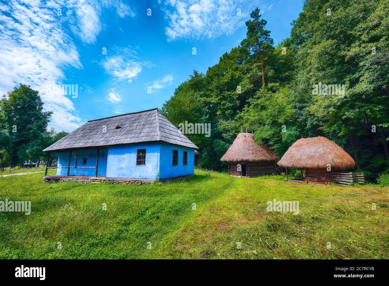 Fantastic summer scene in Transylvania. View of traditional romanian ...