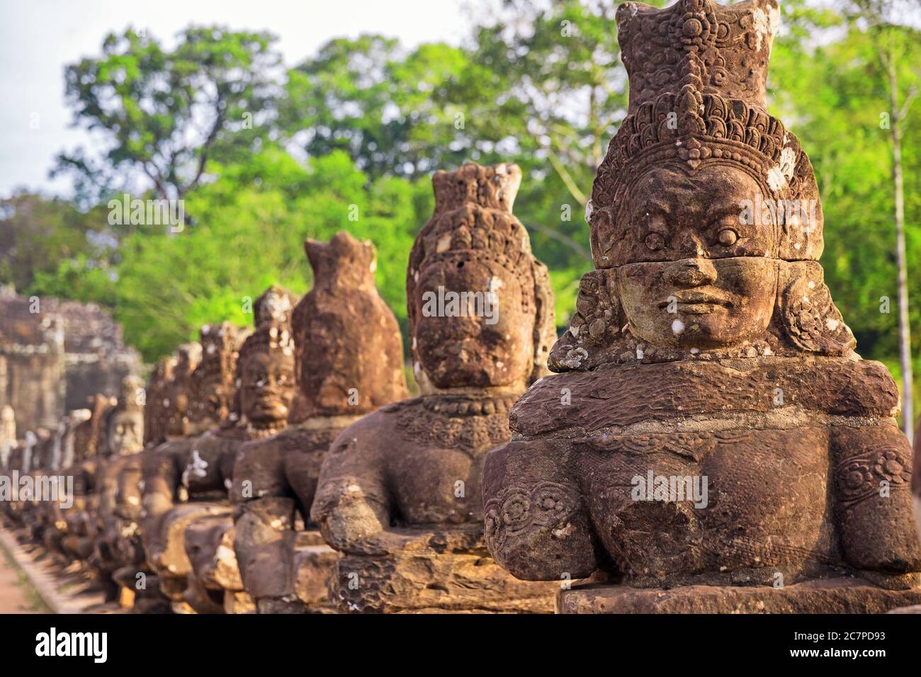 Sculptures of demons of Asia. South gate to Angkor Thom in Cambodia ...