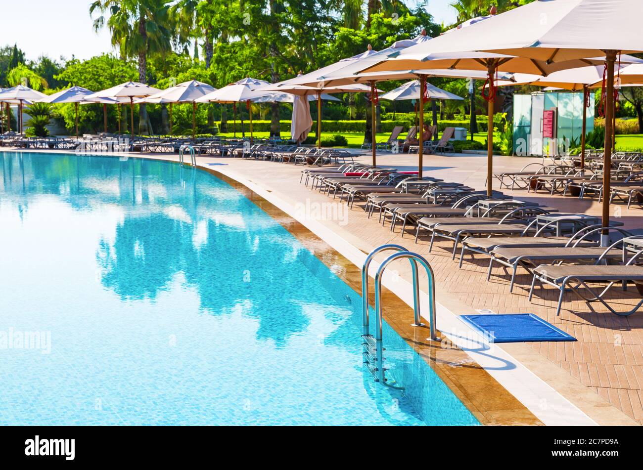 Beautiful luxury swimming pool in hotel resort Stock Photo - Alamy