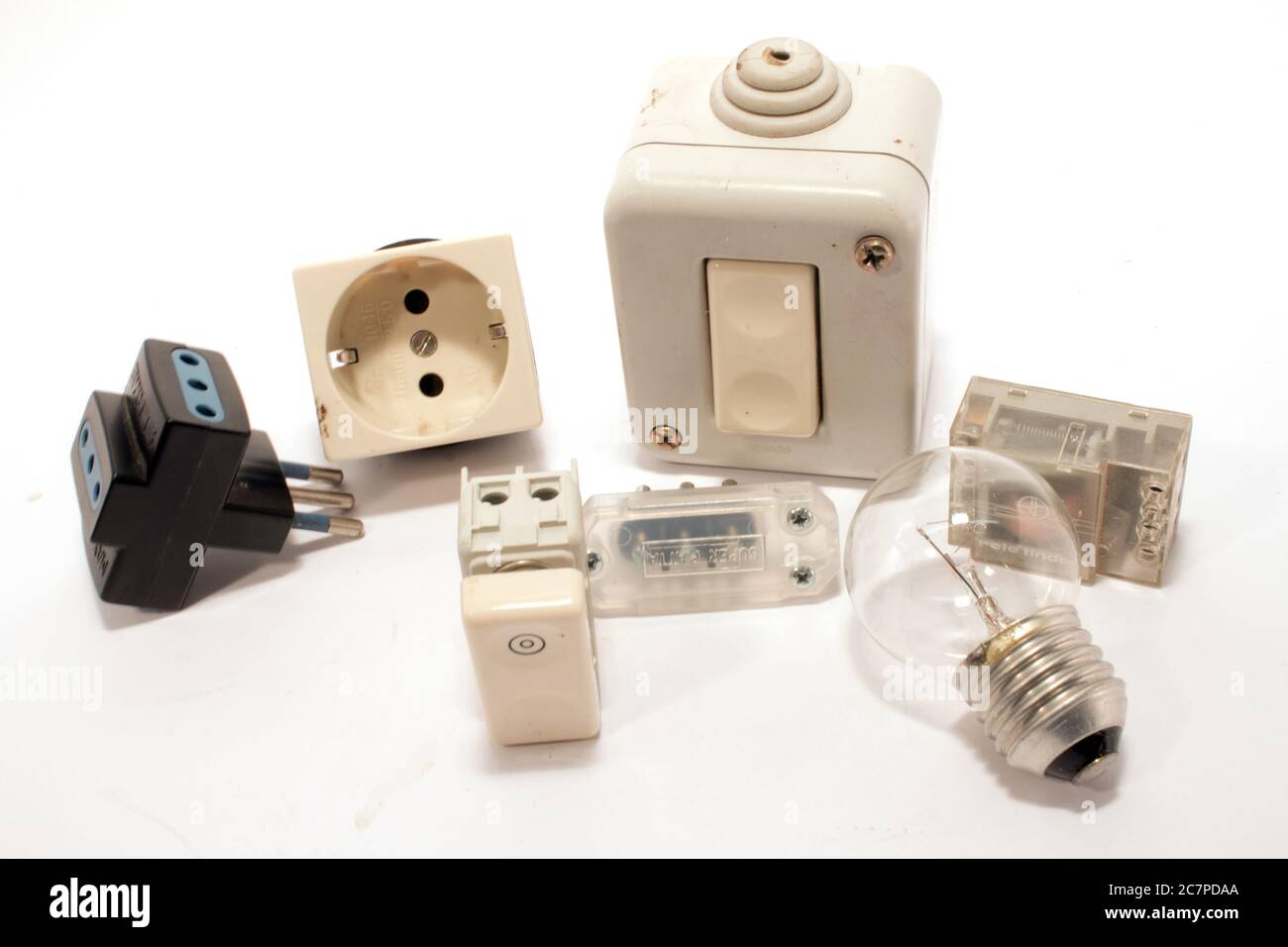 Set of electric sockets, plugs, switches, and light bulbs isolated on a white background Stock ...
