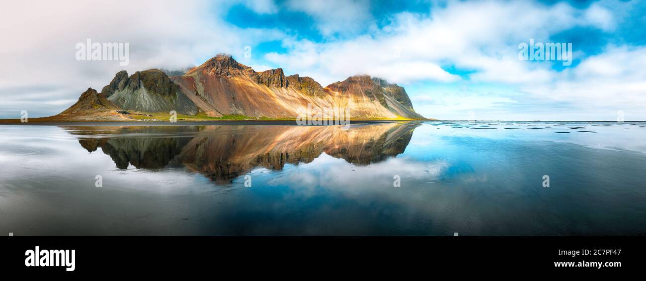 Splendid sunny day and gorgeous reflection of Vestrahorn mountaine on ...
