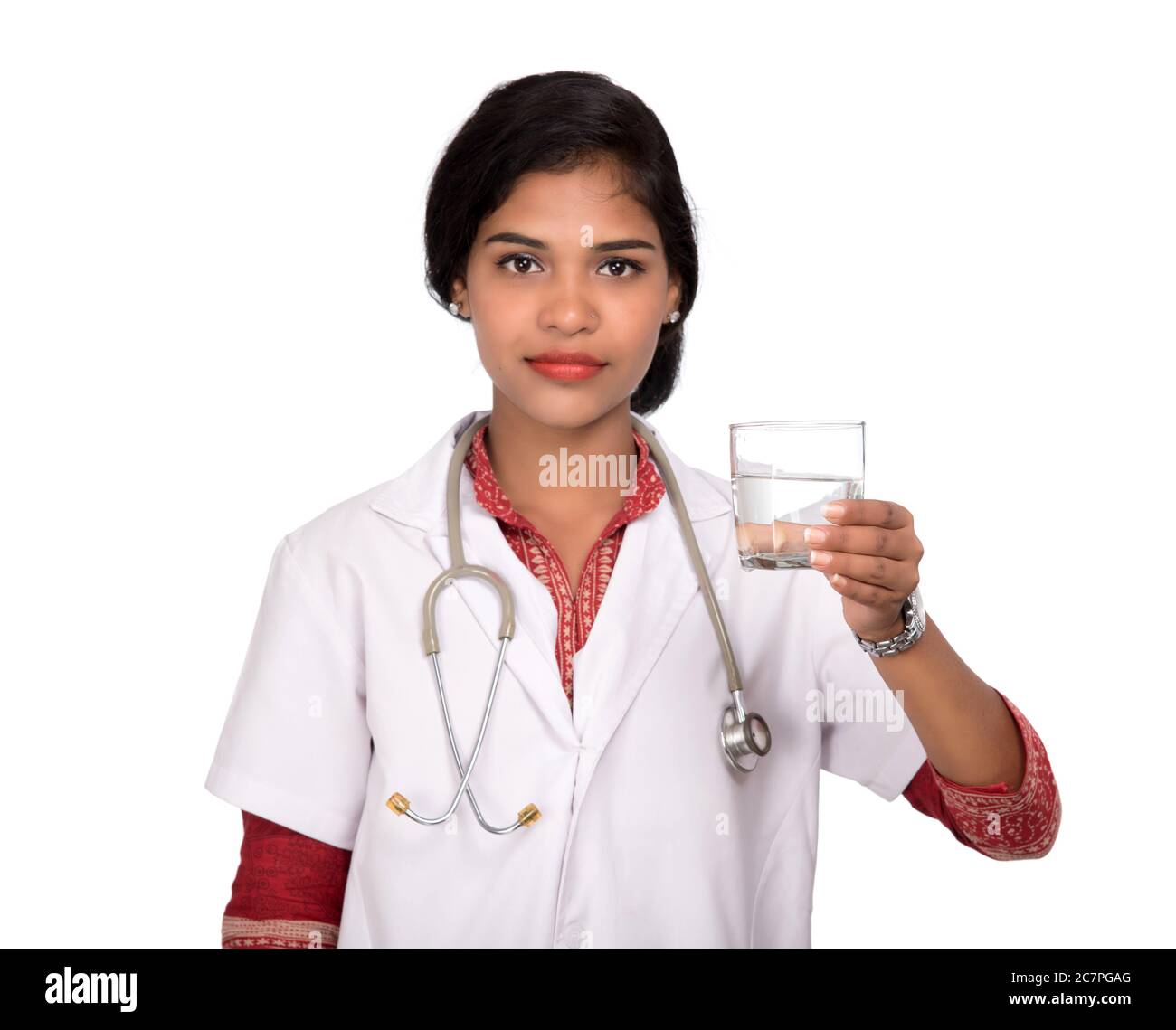 Healthy eating or lifestyle concept: Smiling female doctor holding a ...