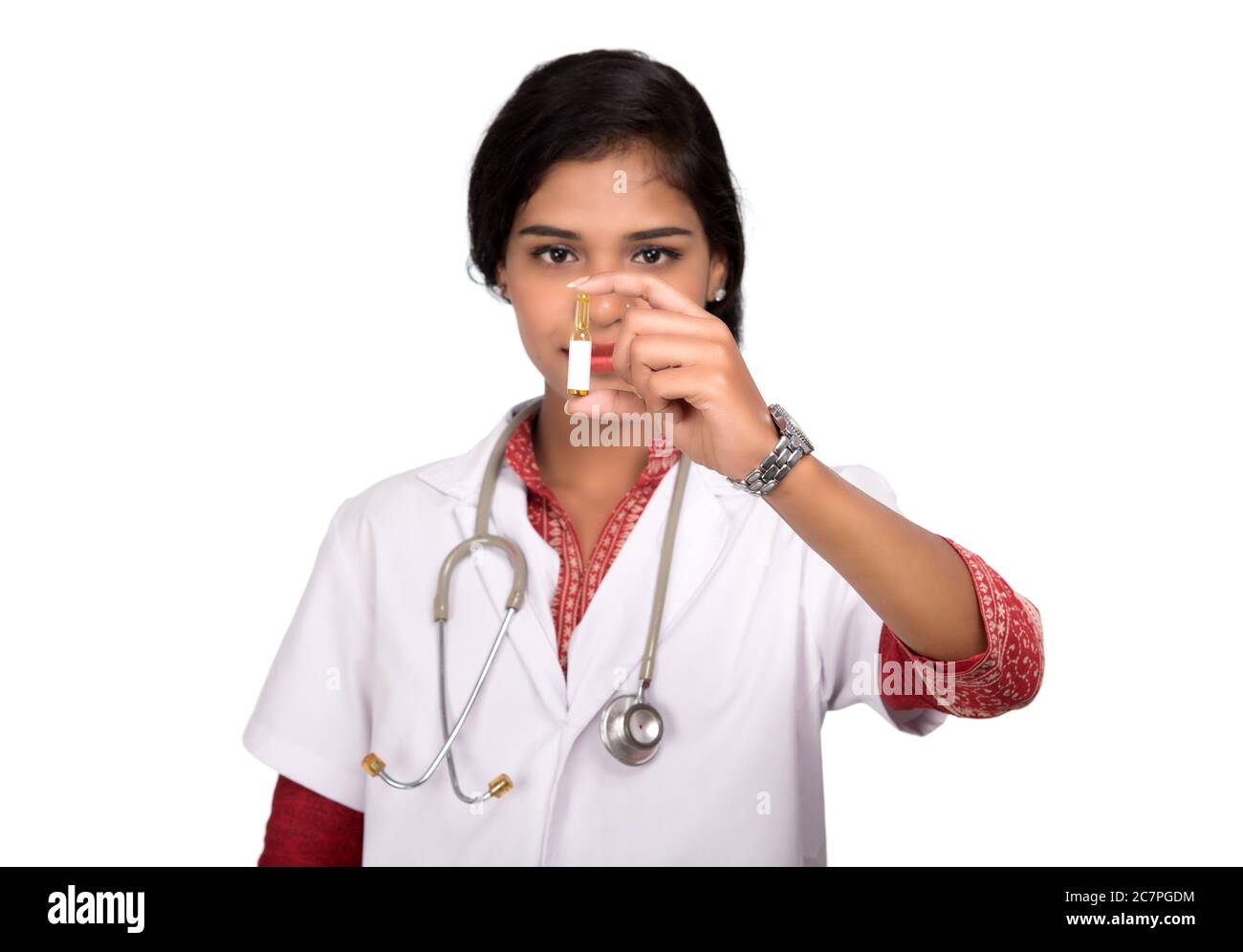 Female Doctor showing the tube of medicine on white background Stock ...