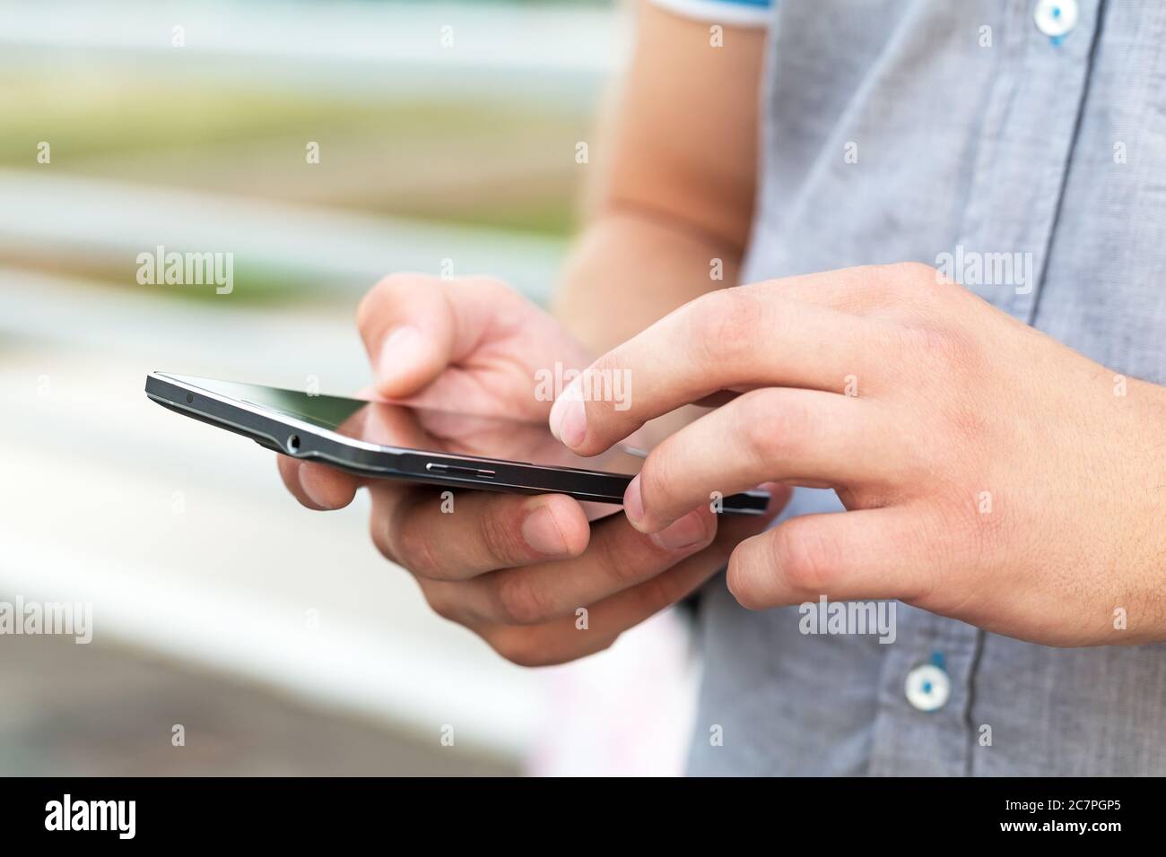 Professional man walking with mobile hi-res stock photography and ...