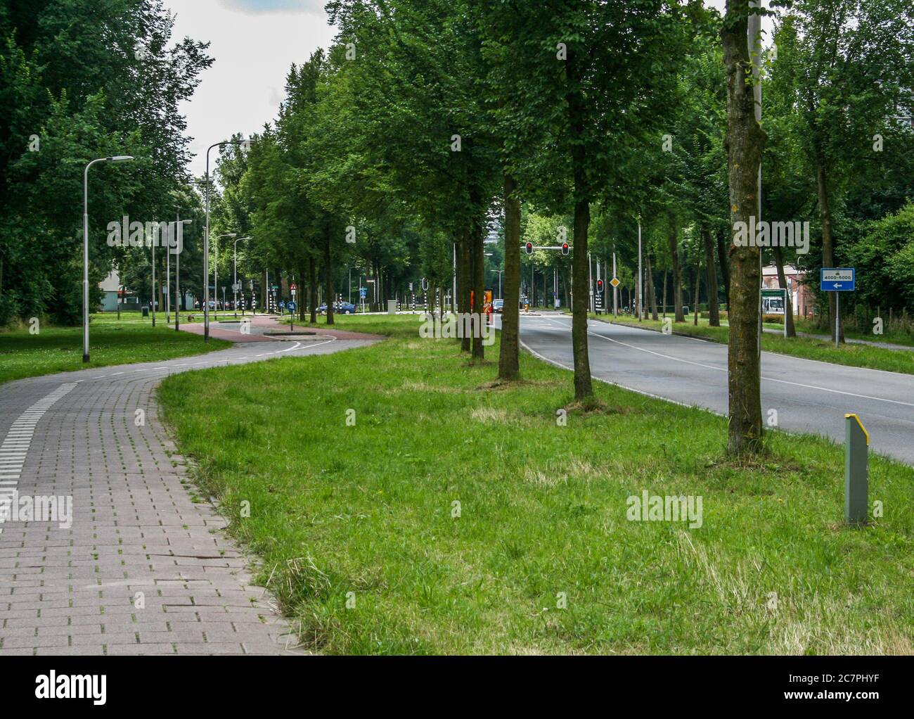 Combined bicyclepath and walkway in the Netherlands Stock Photo - Alamy