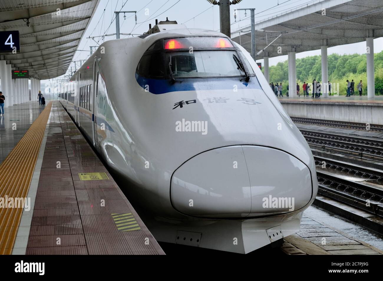 close up white locomotive of China Railway High-Speed train in railway ...
