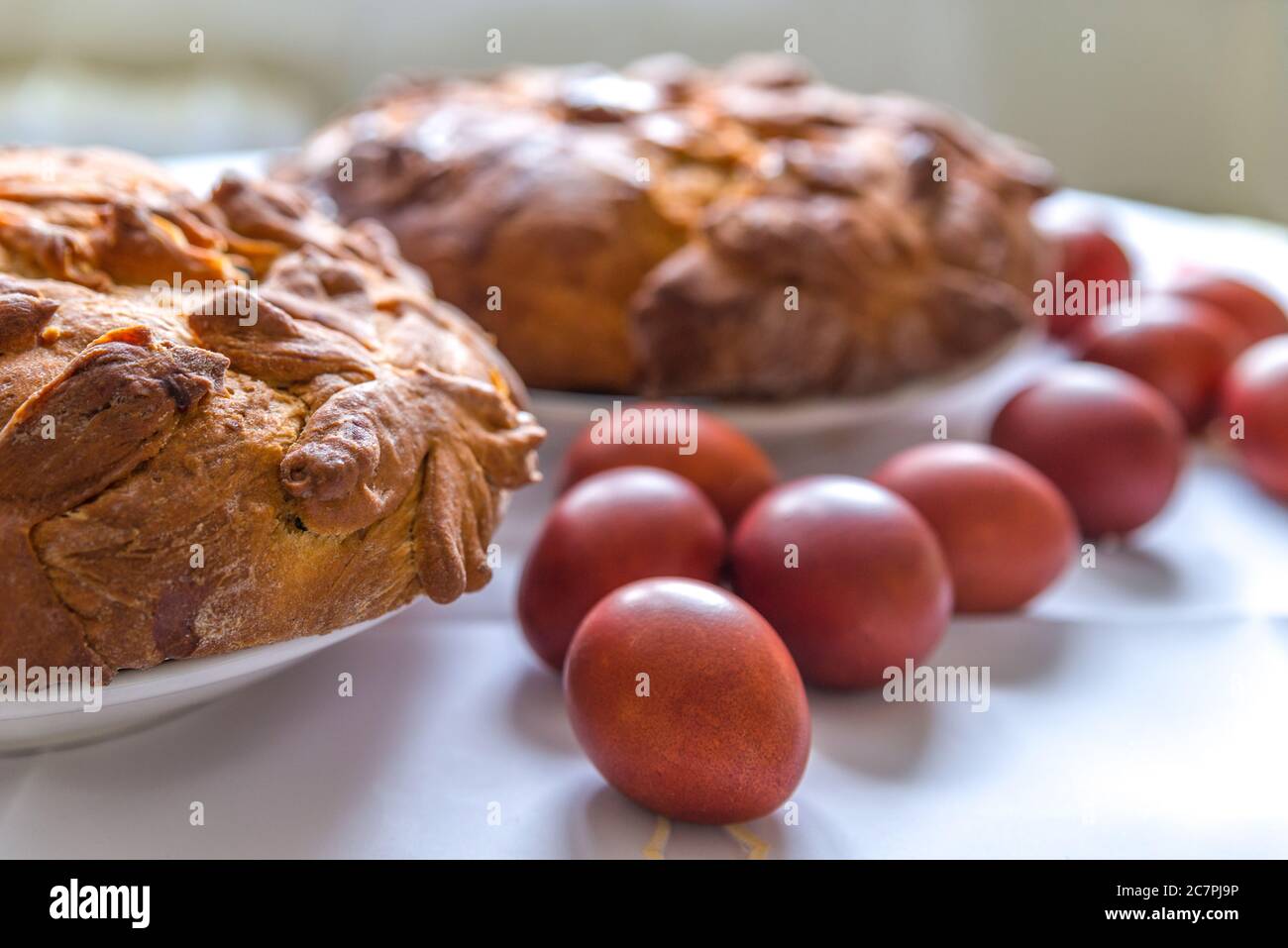 Christian Easter homemade cake and red eggs Stock Photo - Alamy