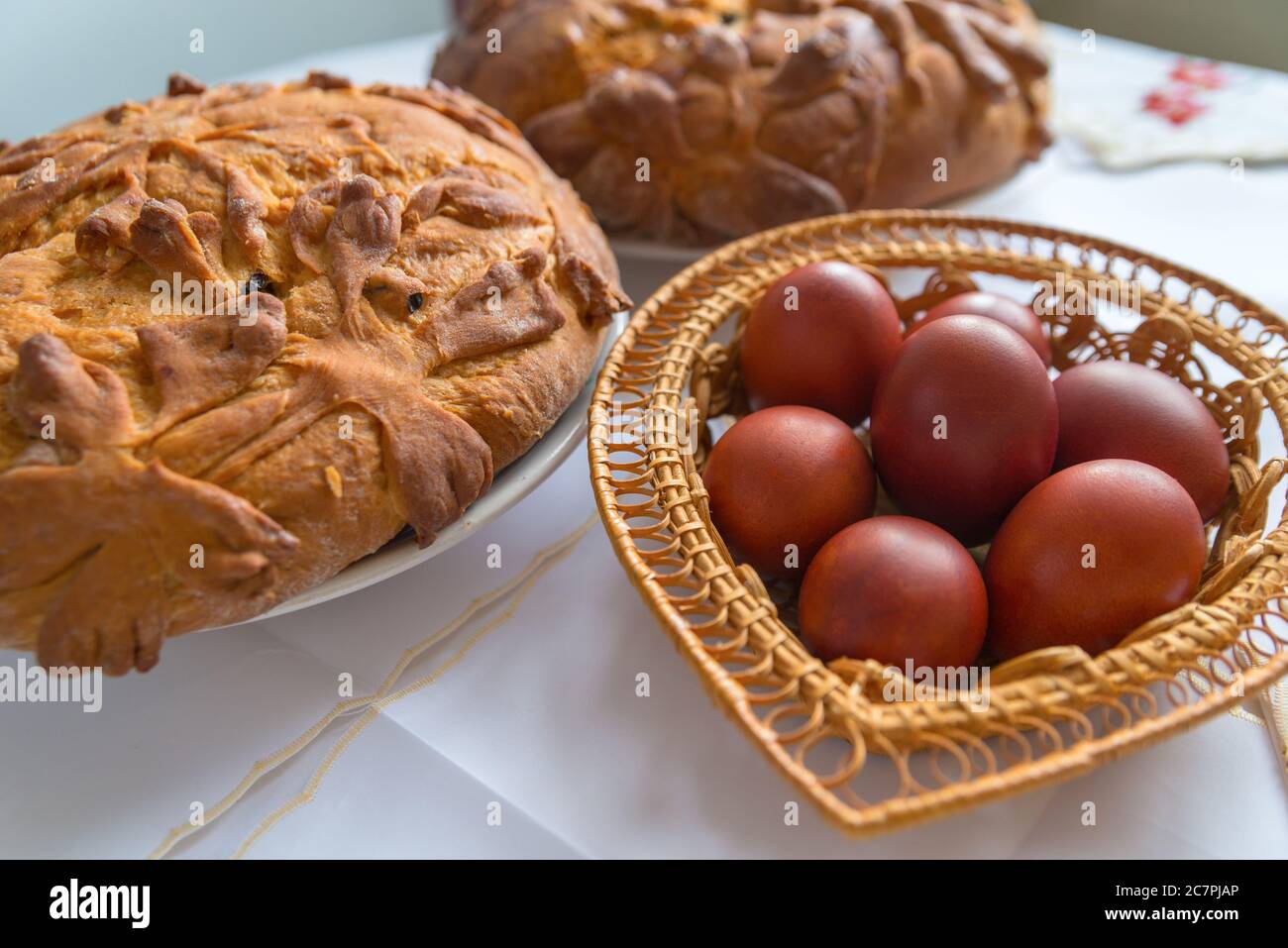 Christian Easter homemade cake and red eggs Stock Photo - Alamy