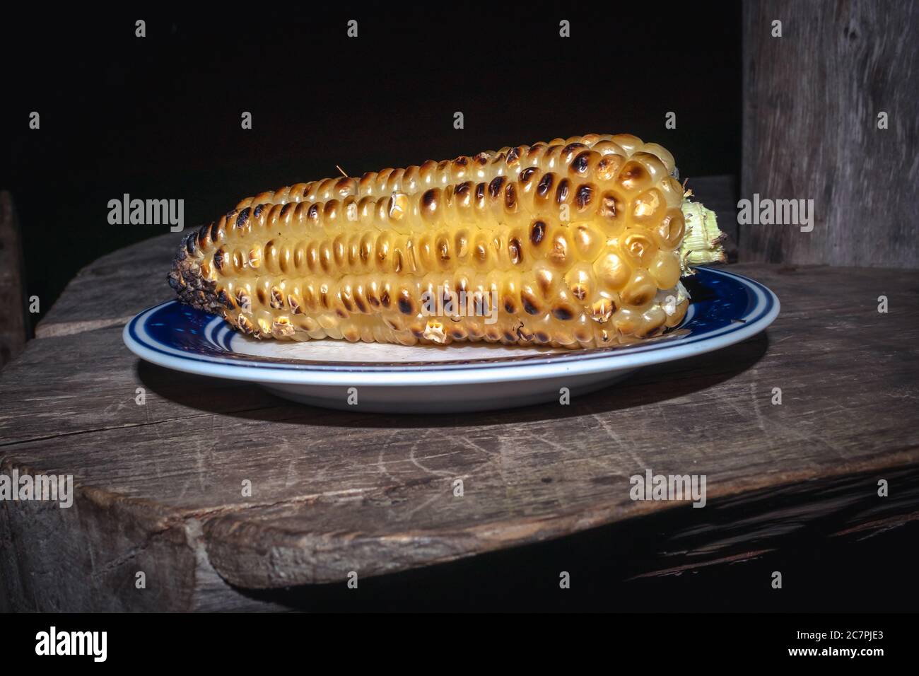 Fire grilled Maize (Zea mays) cob, Uganda, Africa Stock Photo - Alamy