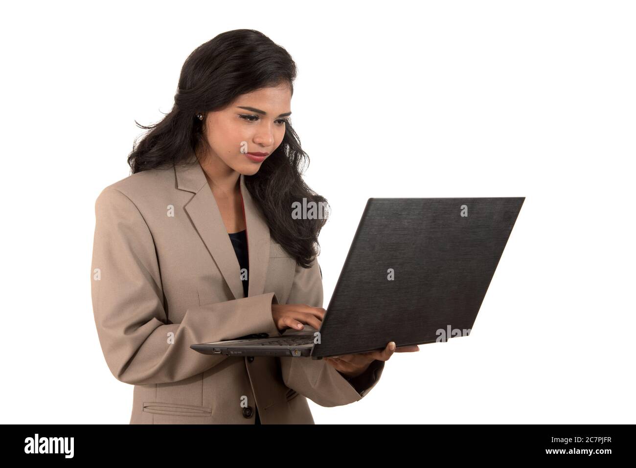 Young happy smiling woman holding laptop Stock Photo - Alamy