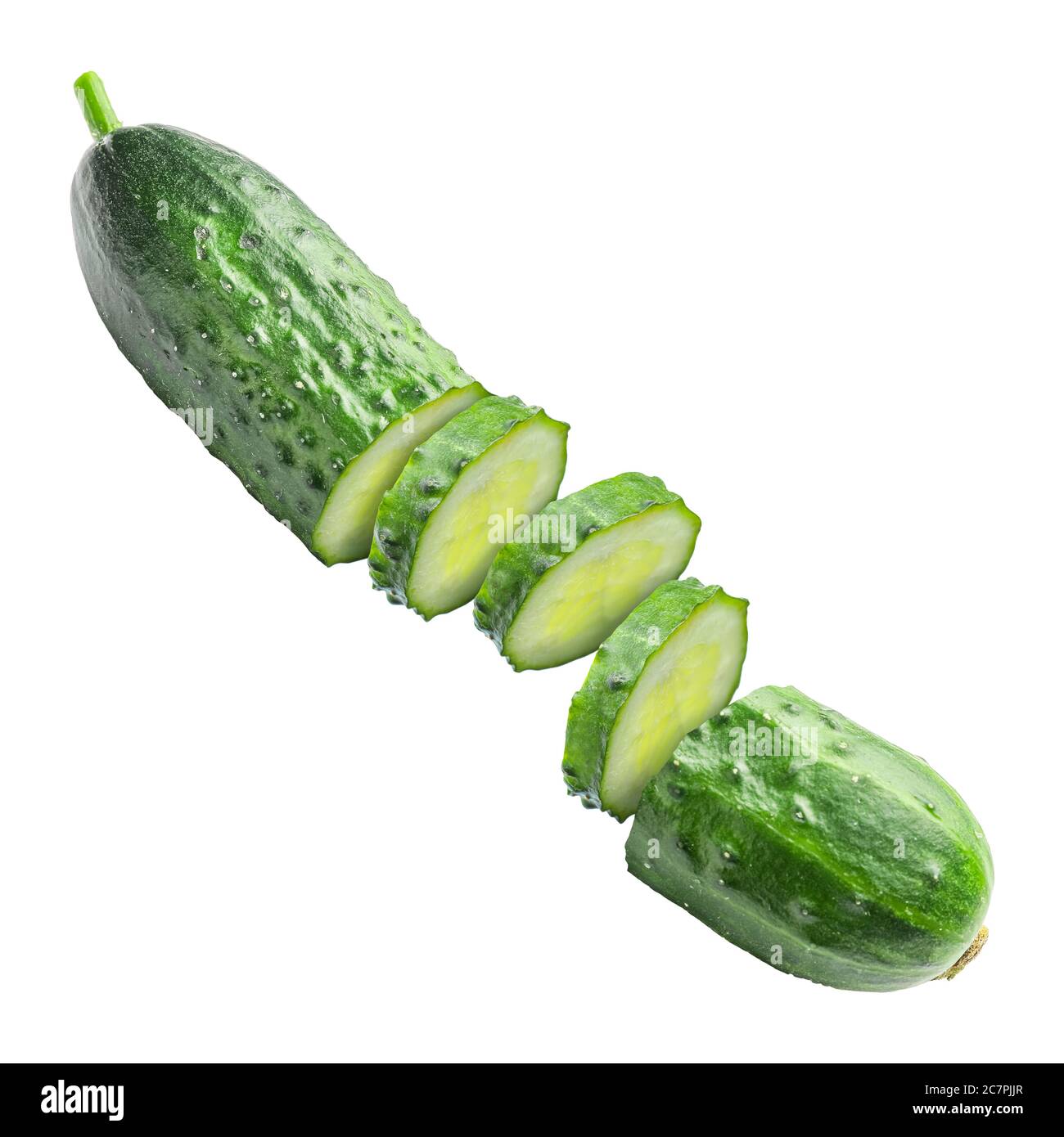 Flying cut cucumber on white background Stock Photo - Alamy