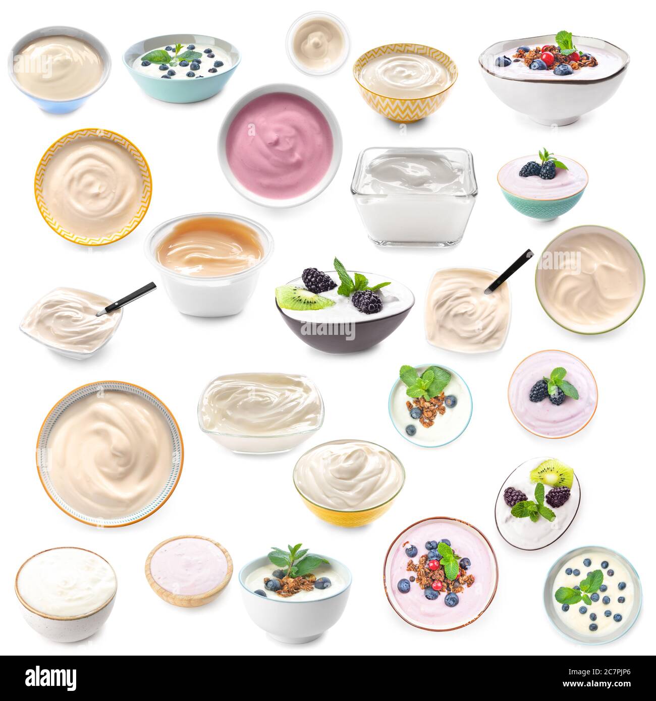Different tasty yogurts on white background Stock Photo - Alamy