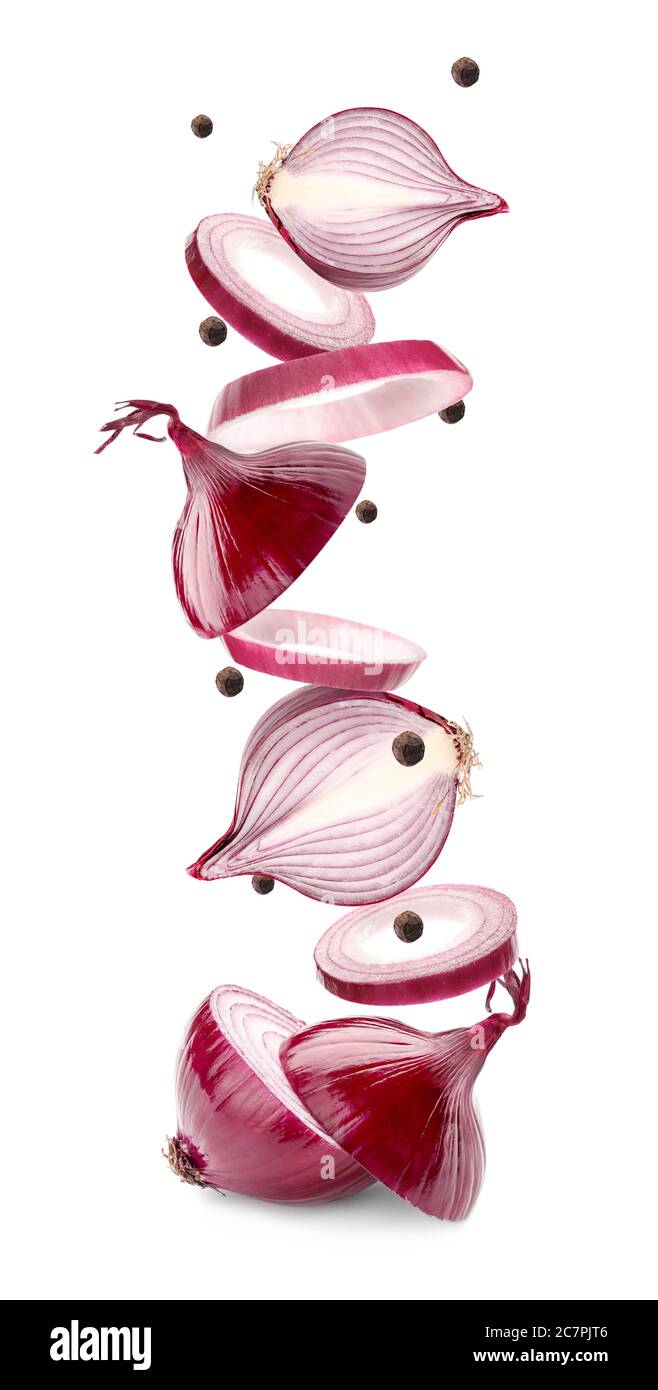 Cut flying onion on white background Stock Photo - Alamy