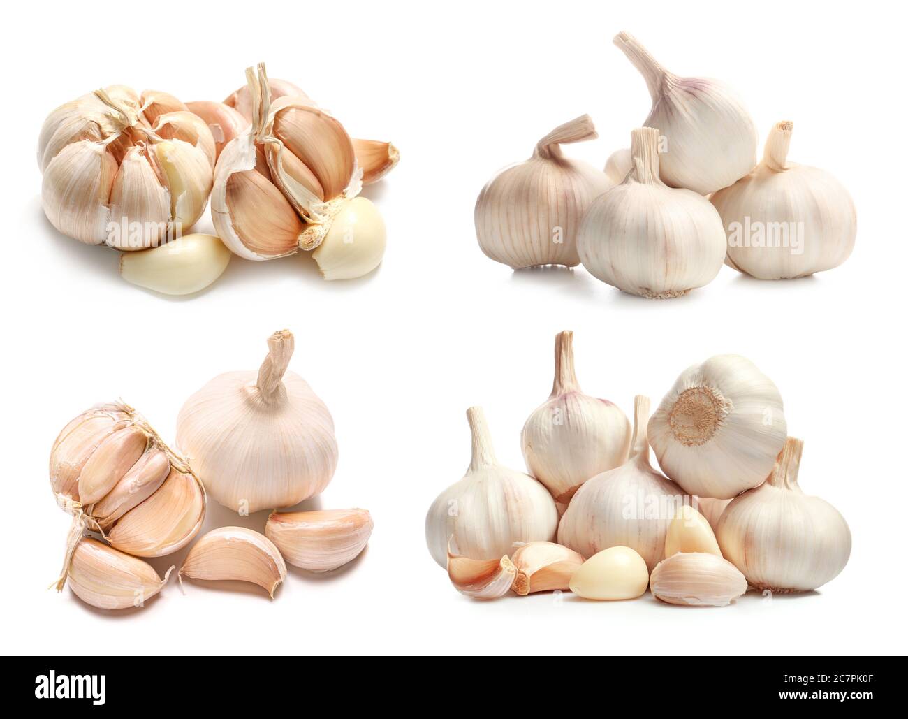 Many fresh garlic on white background Stock Photo - Alamy