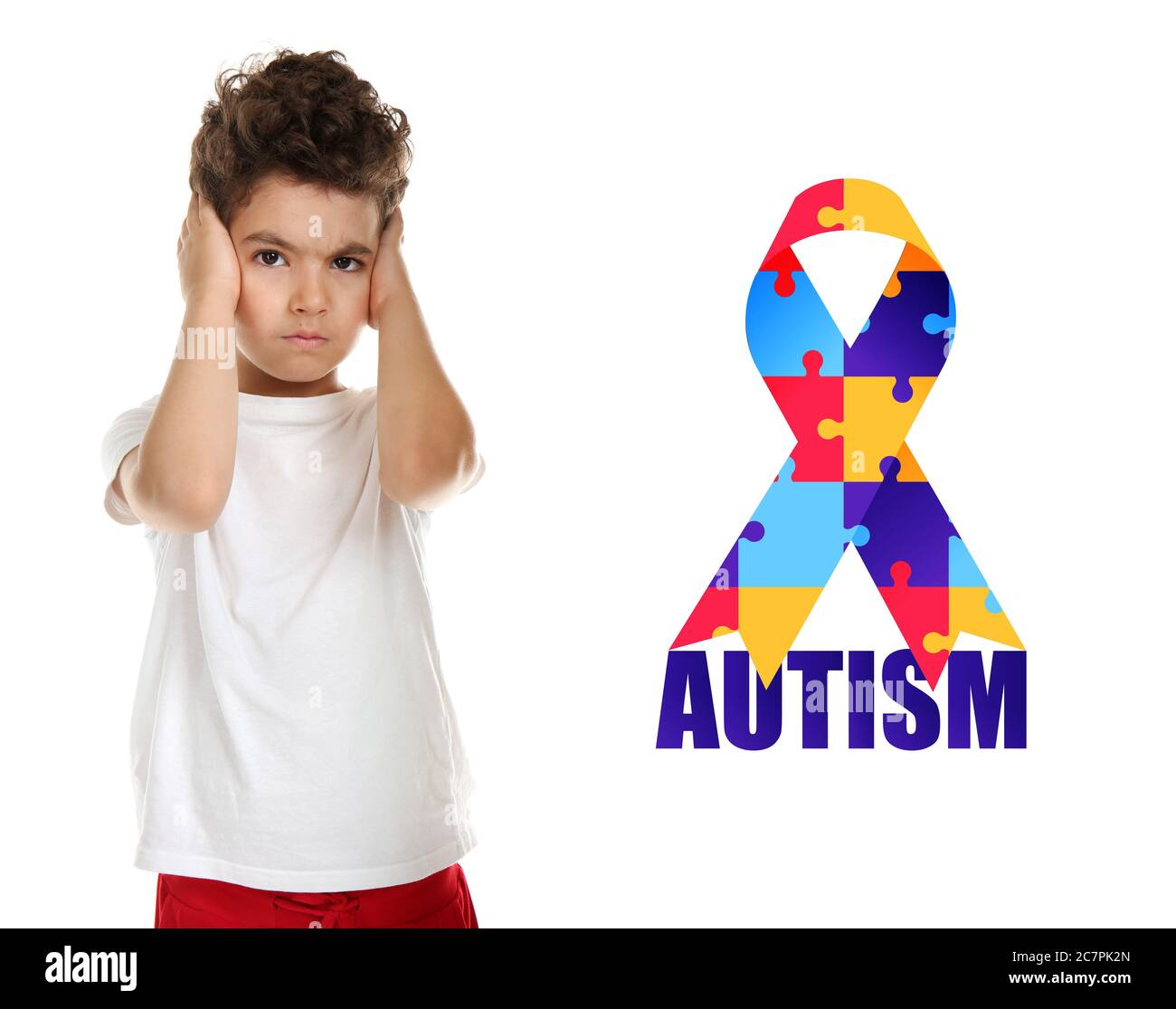 Little boy with autistic disorder covering ears on white background ...