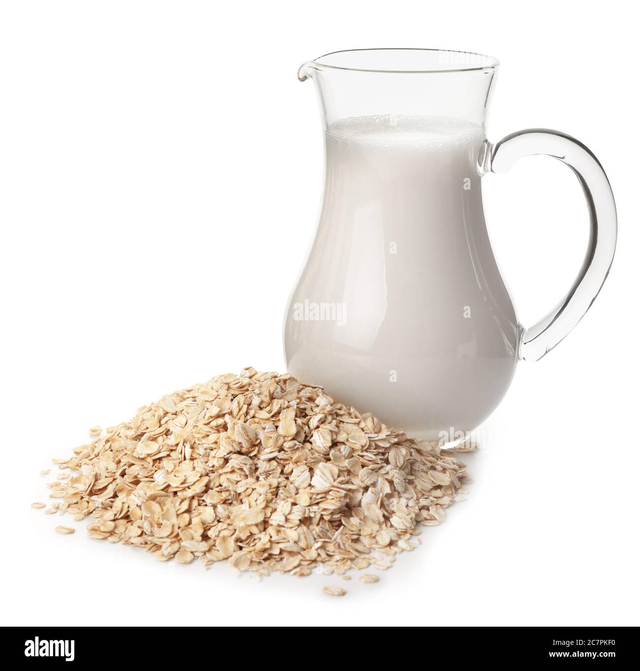 Jug of tasty oat milk on white background Stock Photo - Alamy