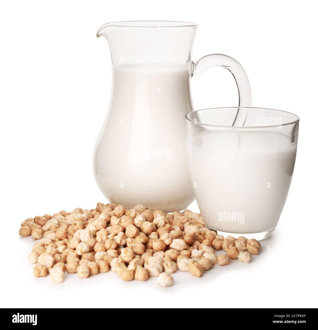Glass and jug of tasty chickpea milk on white background Stock Photo ...