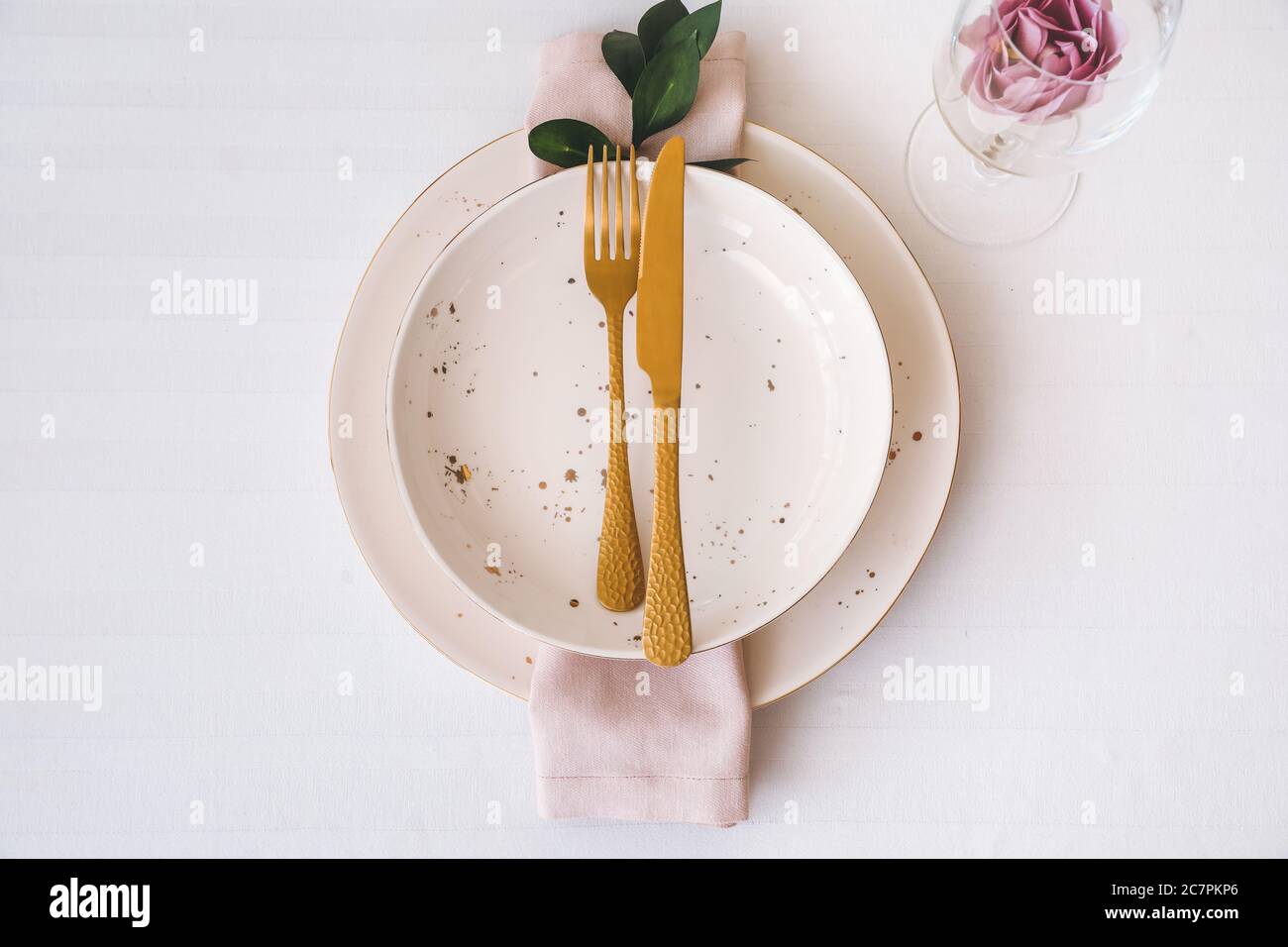 Beautiful table setting on white background Stock Photo - Alamy