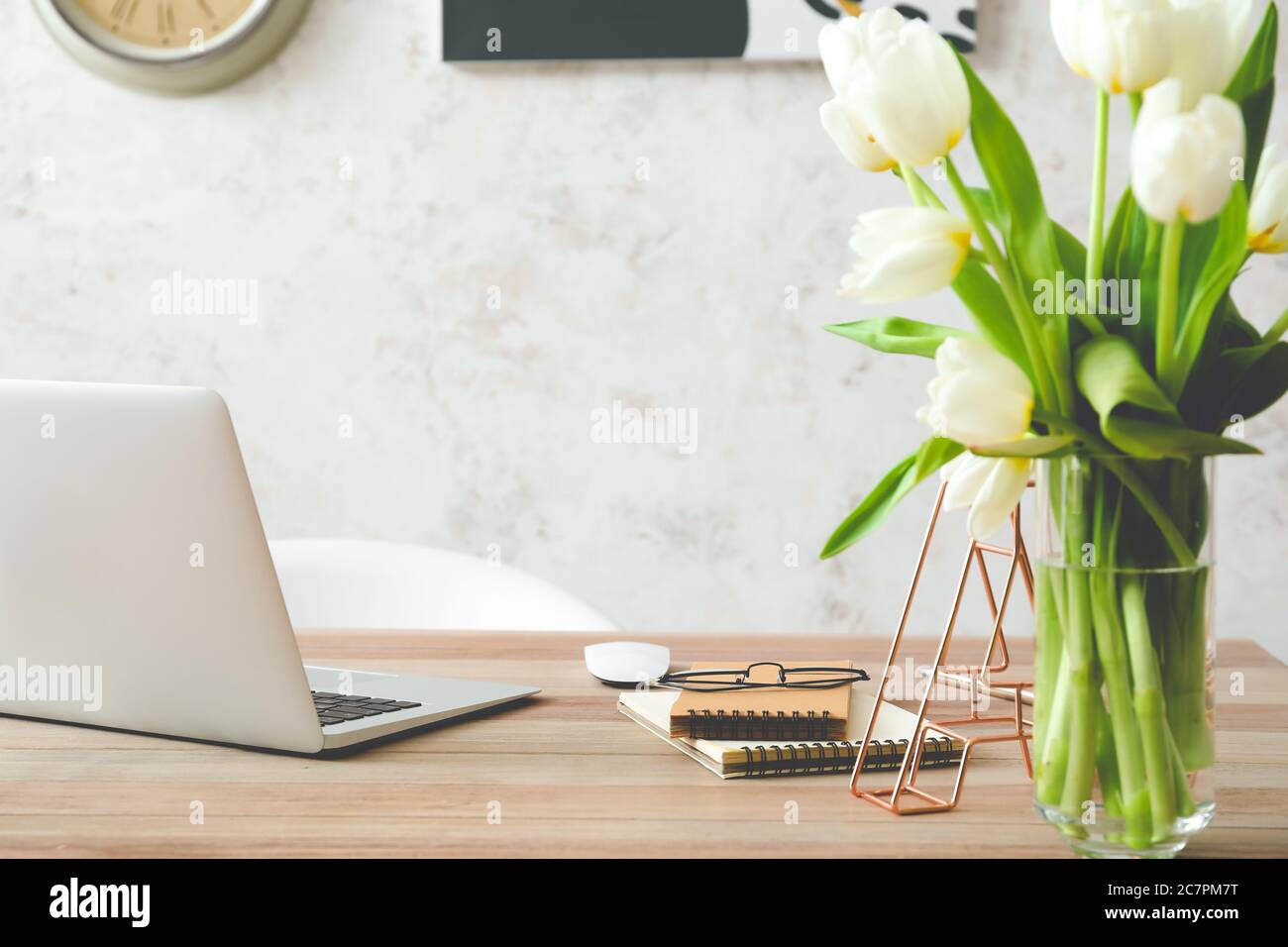 Modern workplace with laptop in room Stock Photo - Alamy