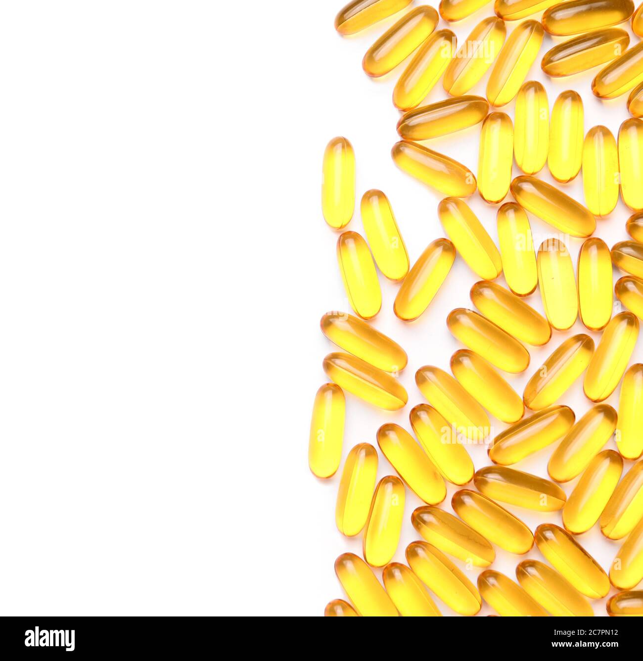 Fish oil capsules on white background Stock Photo - Alamy