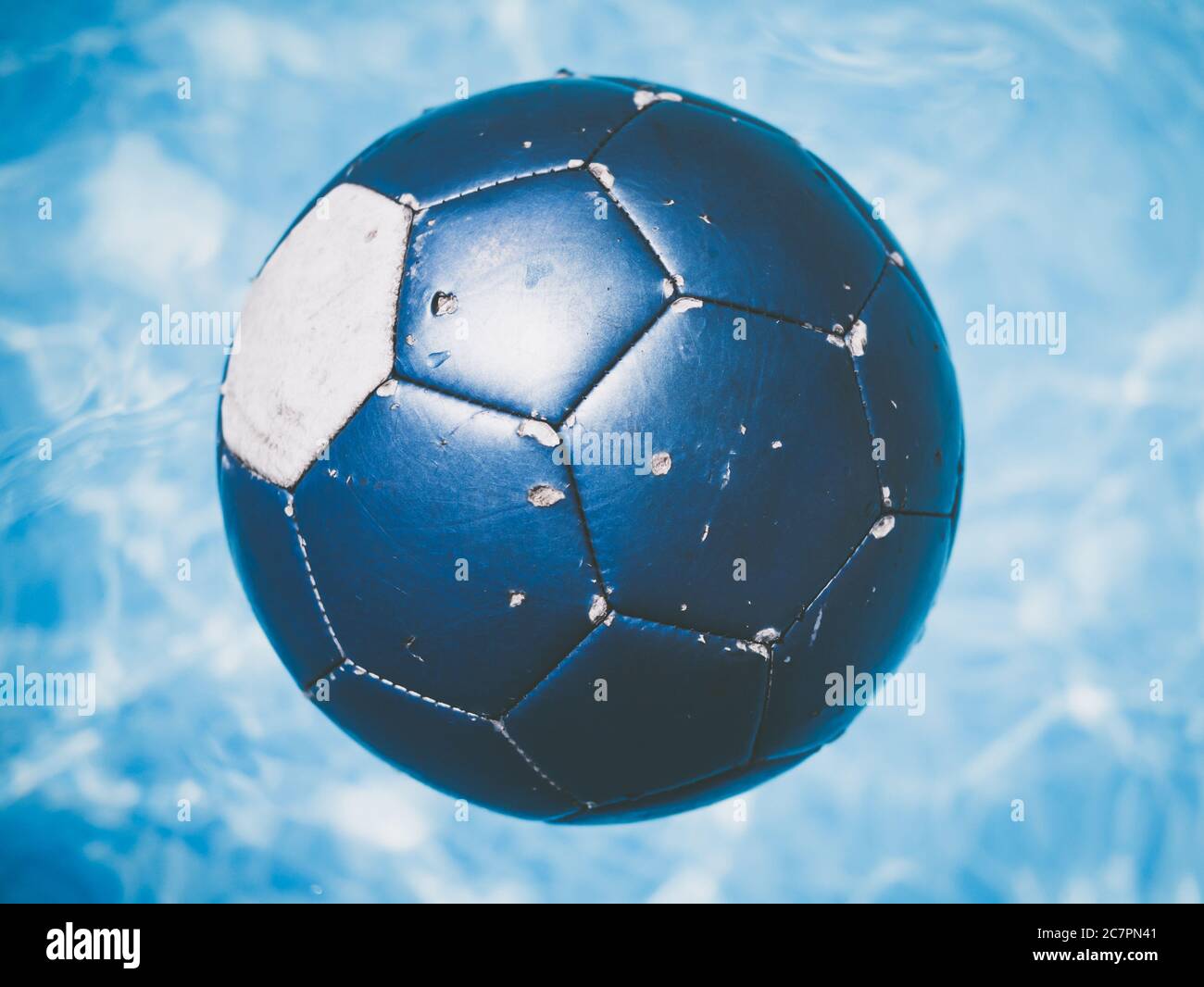 Closeup shot of the blue soccer ball in a swimming pool Stock Photo - Alamy