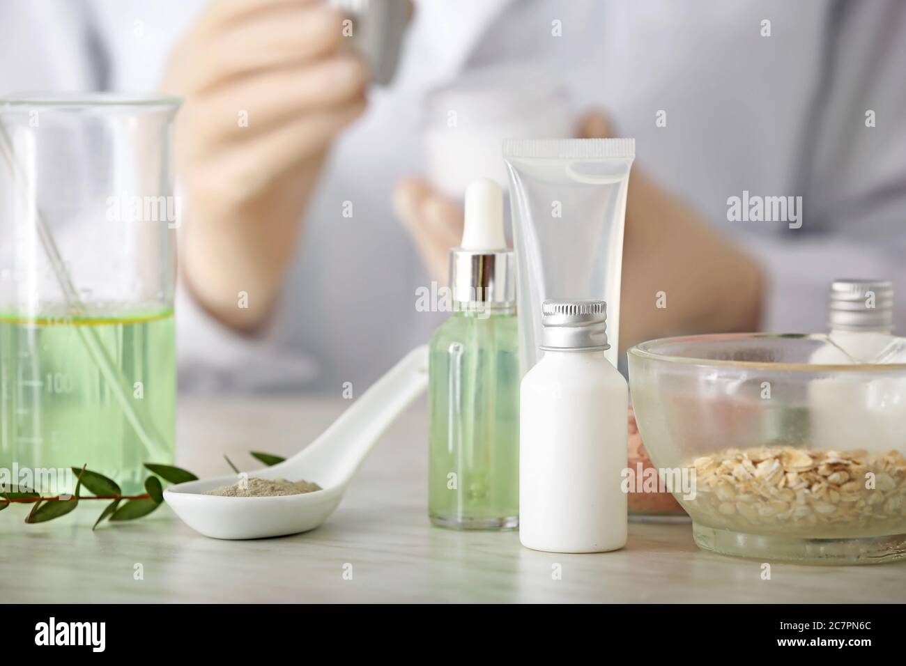 Natural cosmetics with ingredients on table in laboratory Stock Photo ...