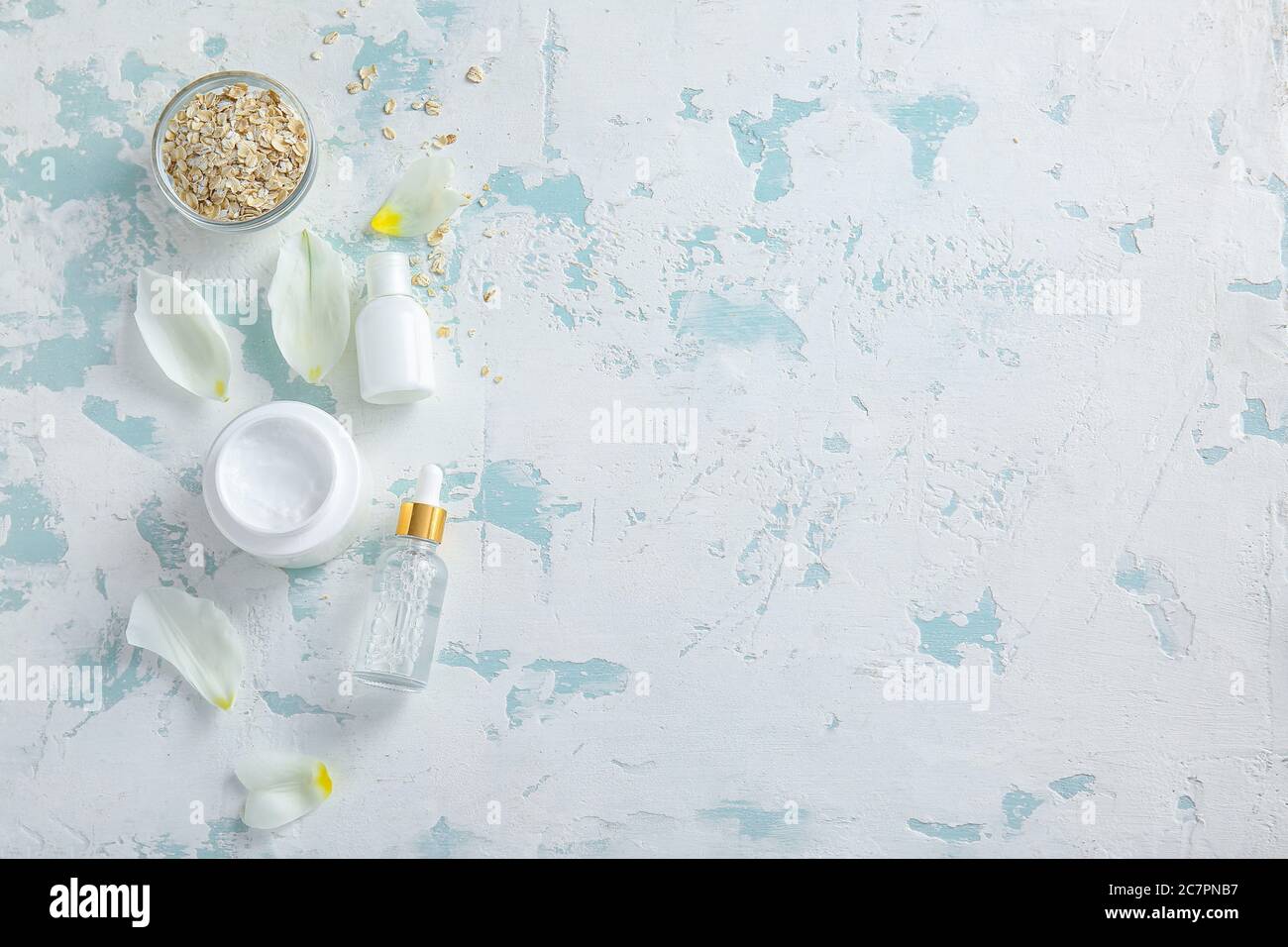 Natural cosmetics with ingredients on white background Stock Photo - Alamy