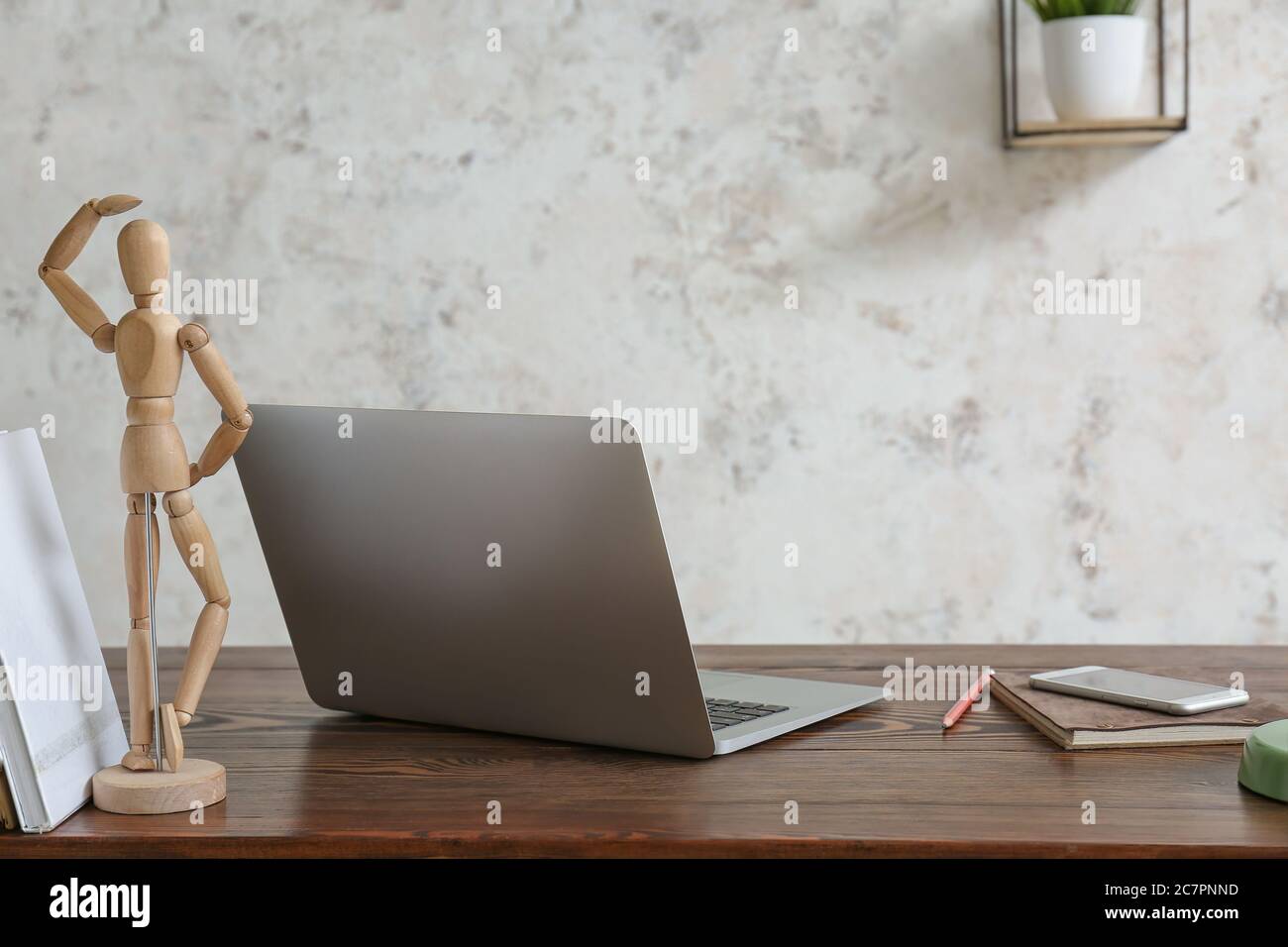 Modern laptop and mobile phone at workplace in room Stock Photo - Alamy