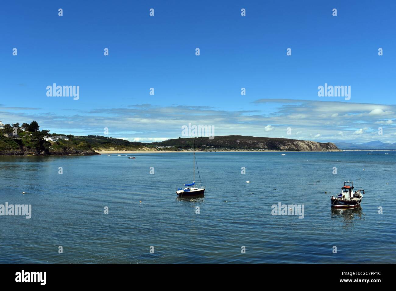 Two boats in the bay at the beautiful Welsh seaside resort of Abersoch ...