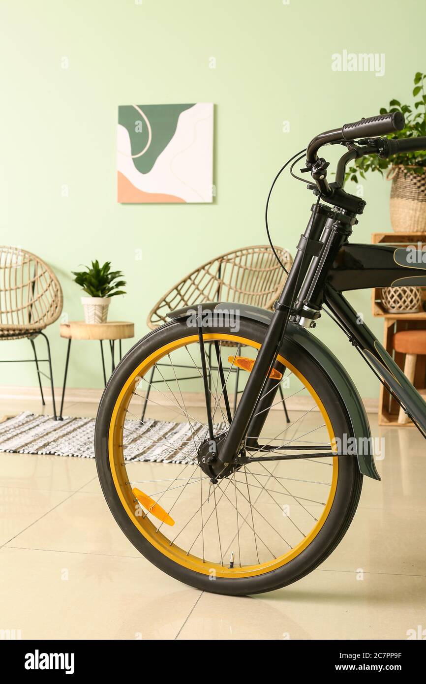 Stylish bicycle in interior of modern room Stock Photo - Alamy