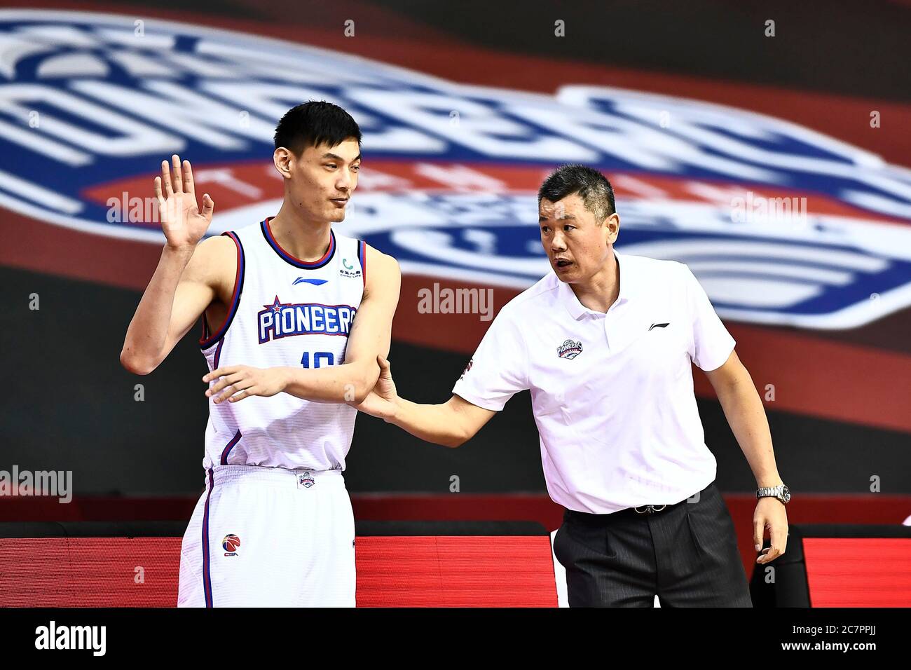 Qingdao, China's Shandong Province. 19th July, 2020. Liu Tie (R), head ...
