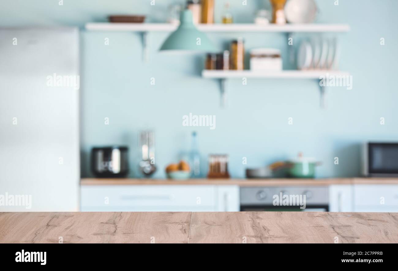 Empty table in modern kitchen Stock Photo - Alamy