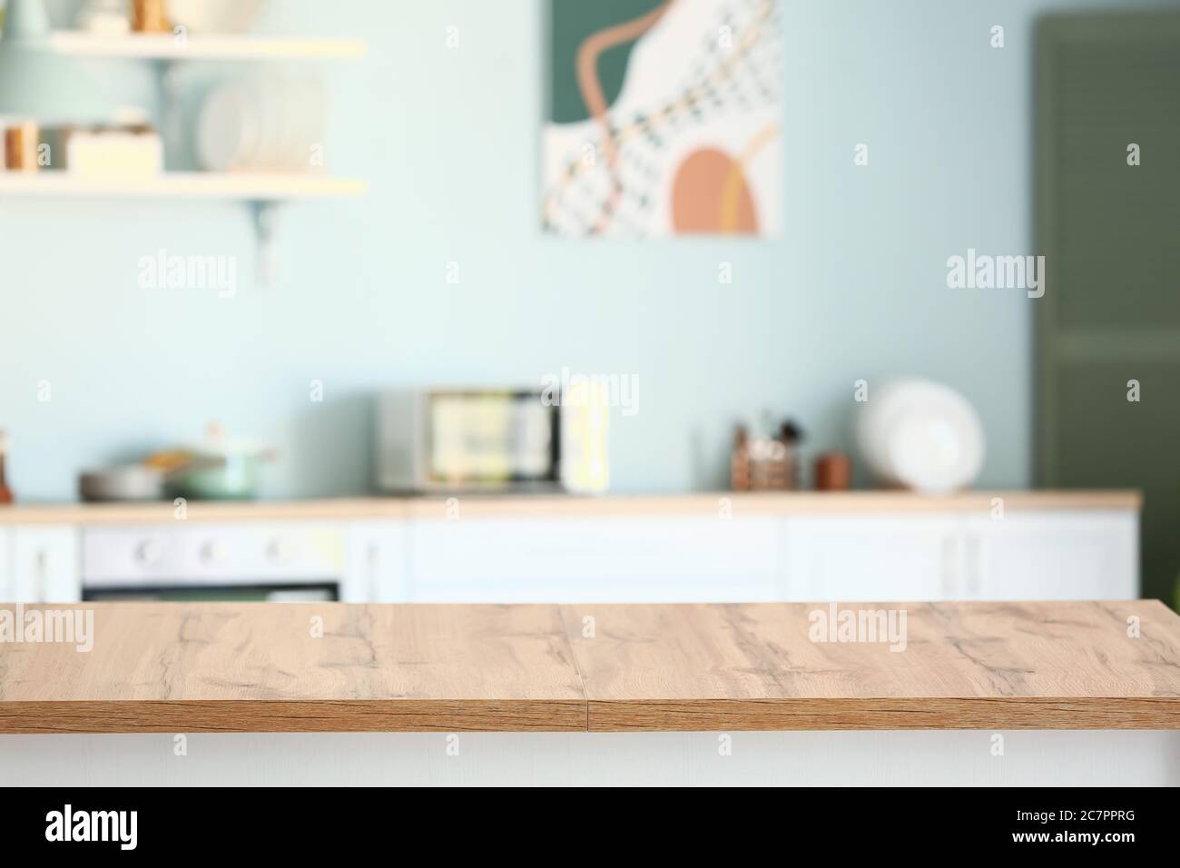 Empty table in modern kitchen Stock Photo - Alamy