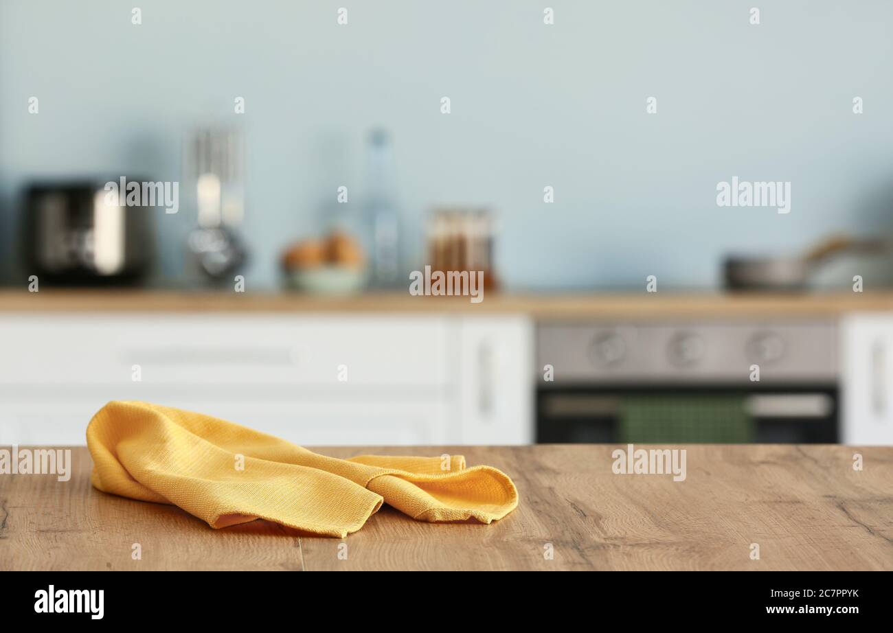 Clean napkin on kitchen table Stock Photo - Alamy