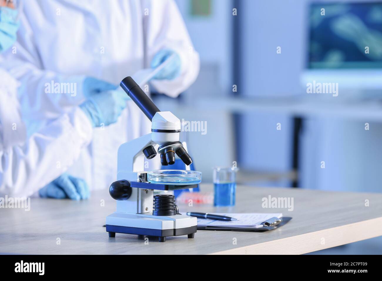 Modern microscope on table in laboratory Stock Photo - Alamy