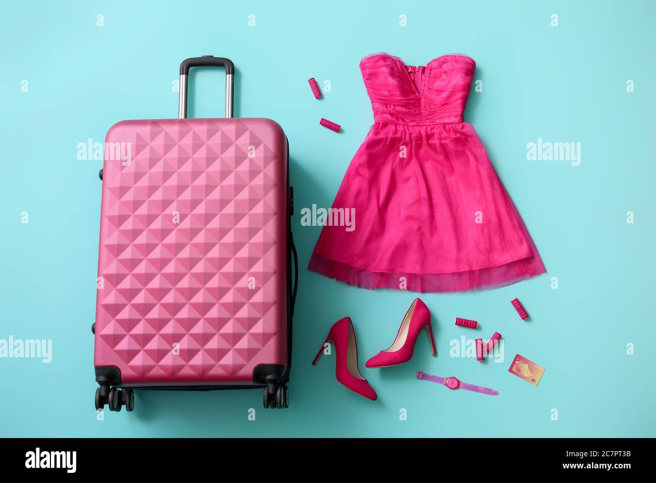 Packed suitcase and accessories on color background Stock Photo - Alamy