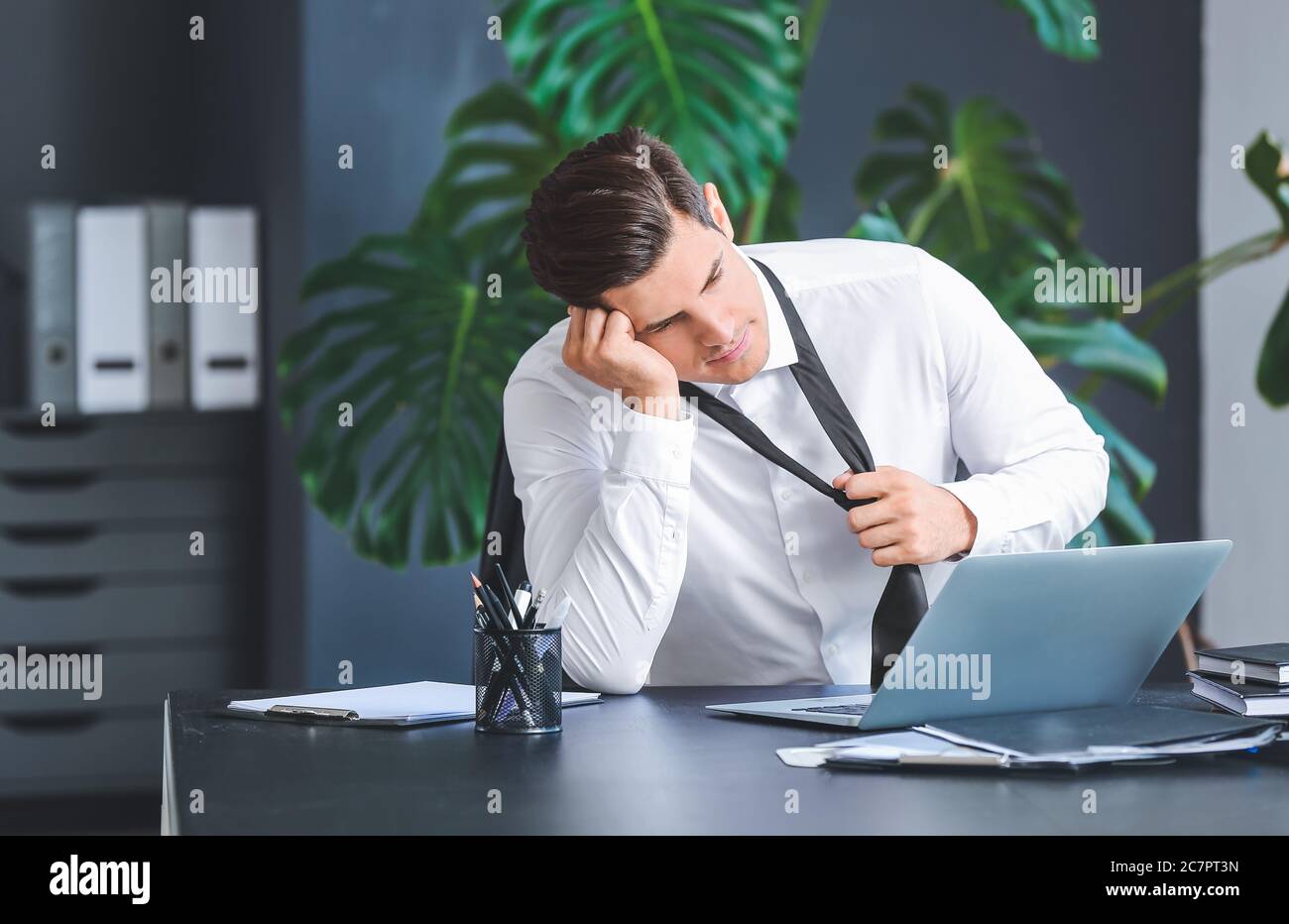 Businessman tired bored waiting hi-res stock photography and images - Alamy