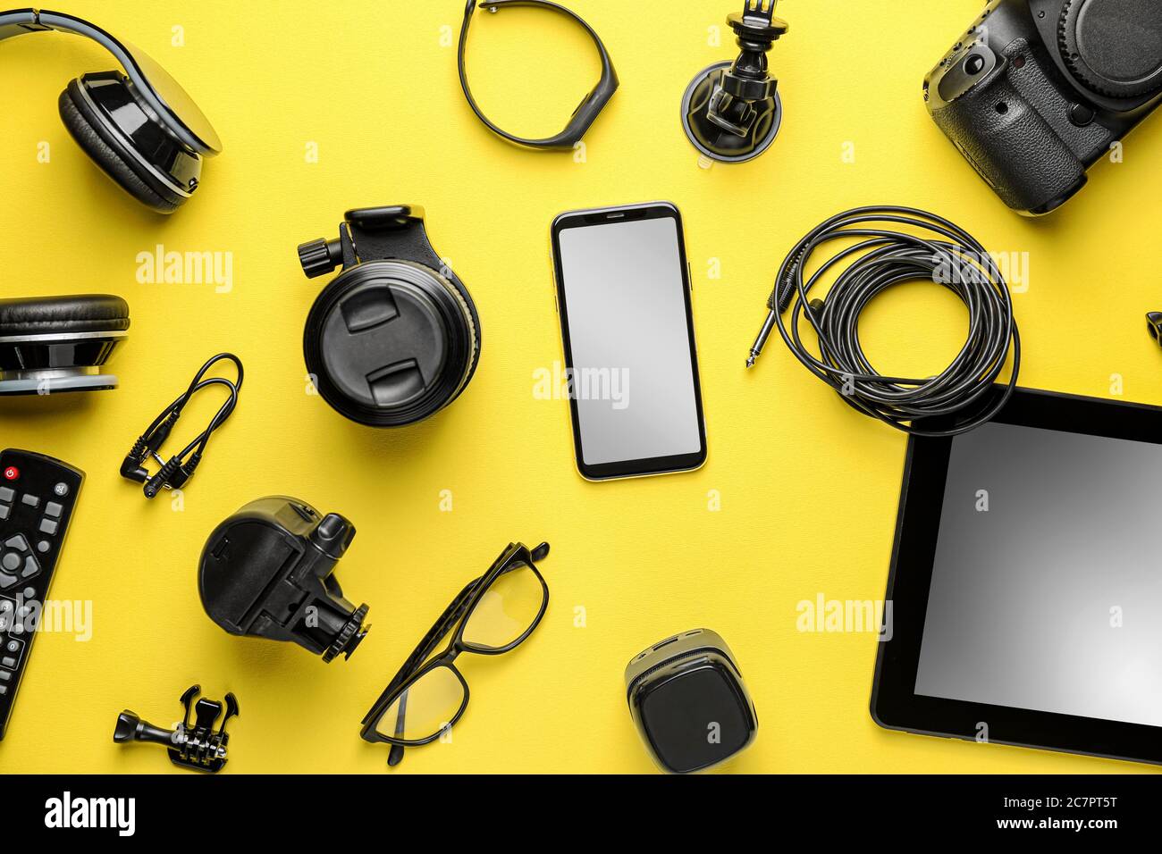 Different modern devices on color background Stock Photo - Alamy