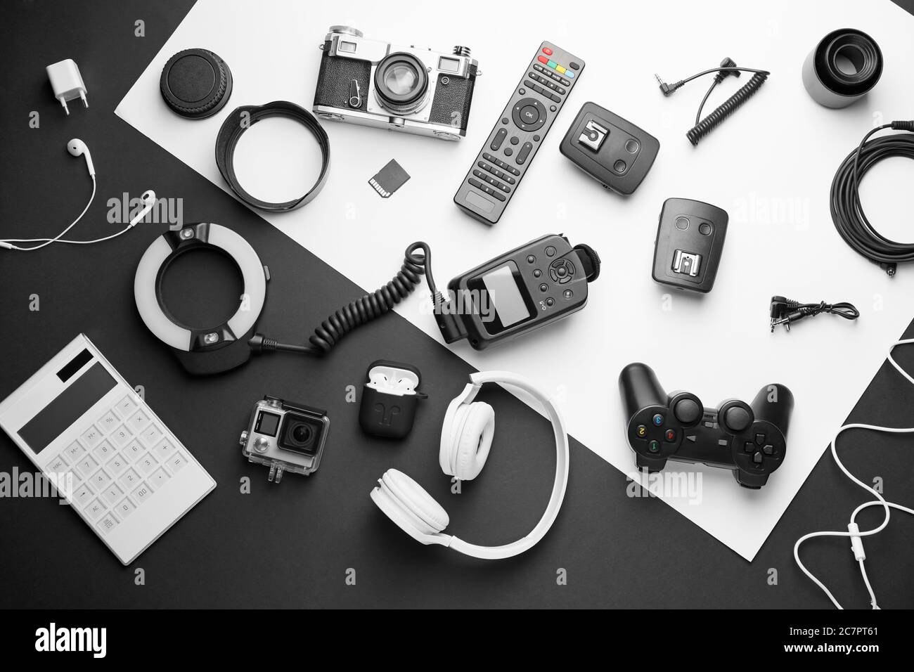 Different modern devices on black and white background Stock Photo - Alamy