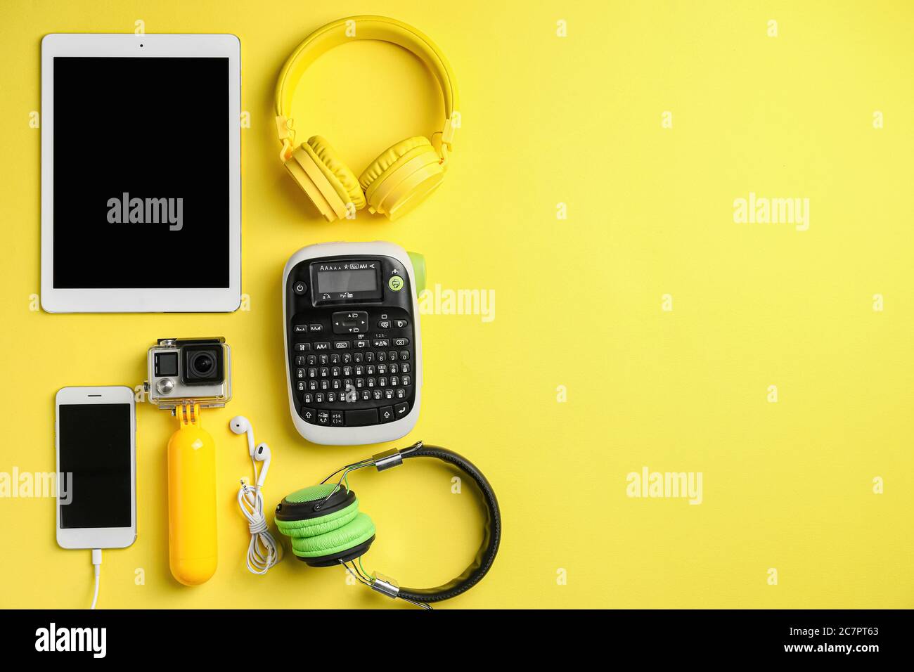Different modern devices on color background Stock Photo - Alamy