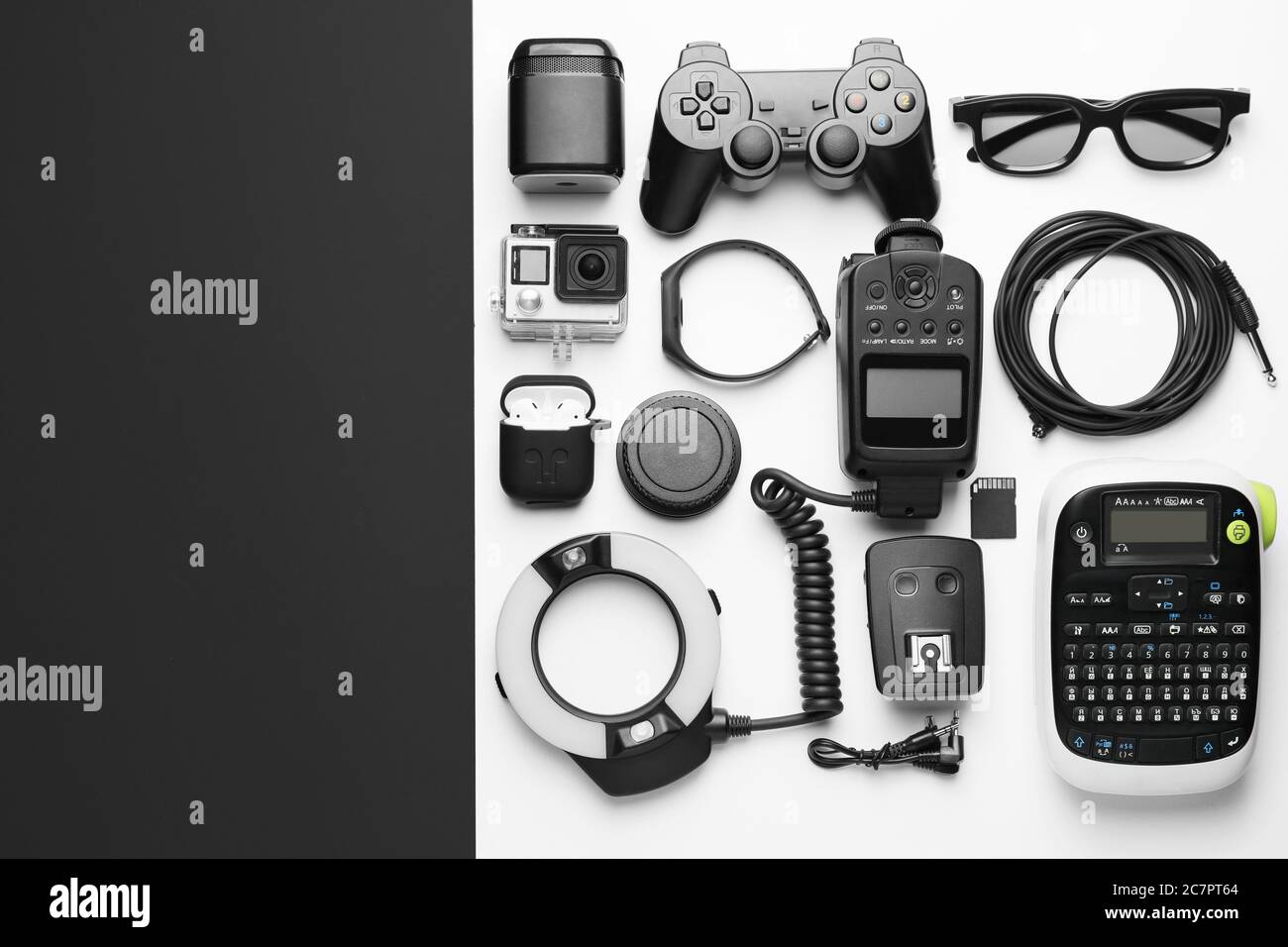 Different modern devices on black and white background Stock Photo - Alamy