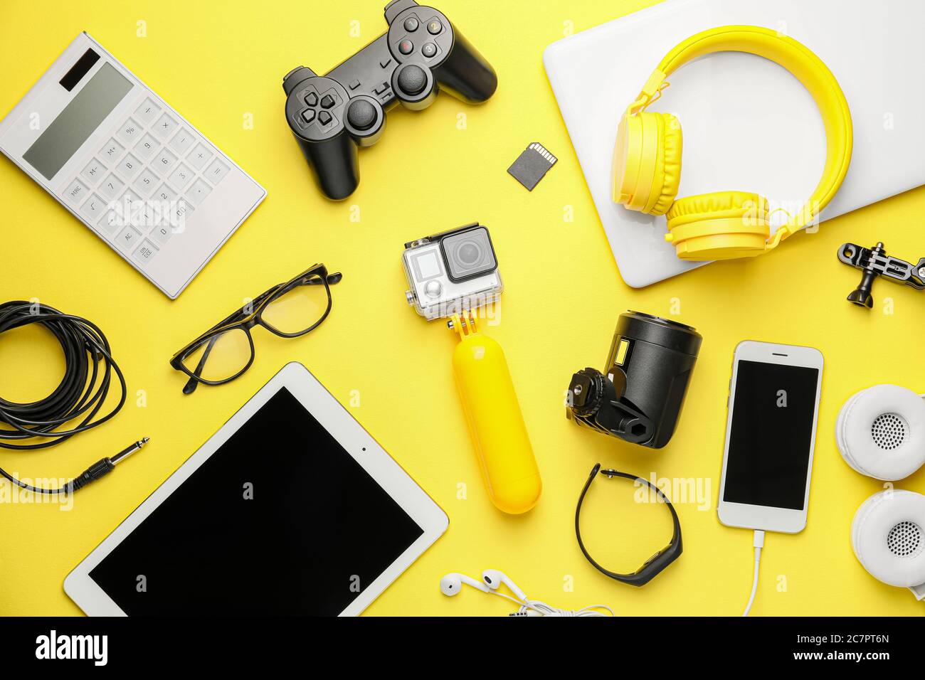 Different modern devices on color background Stock Photo - Alamy